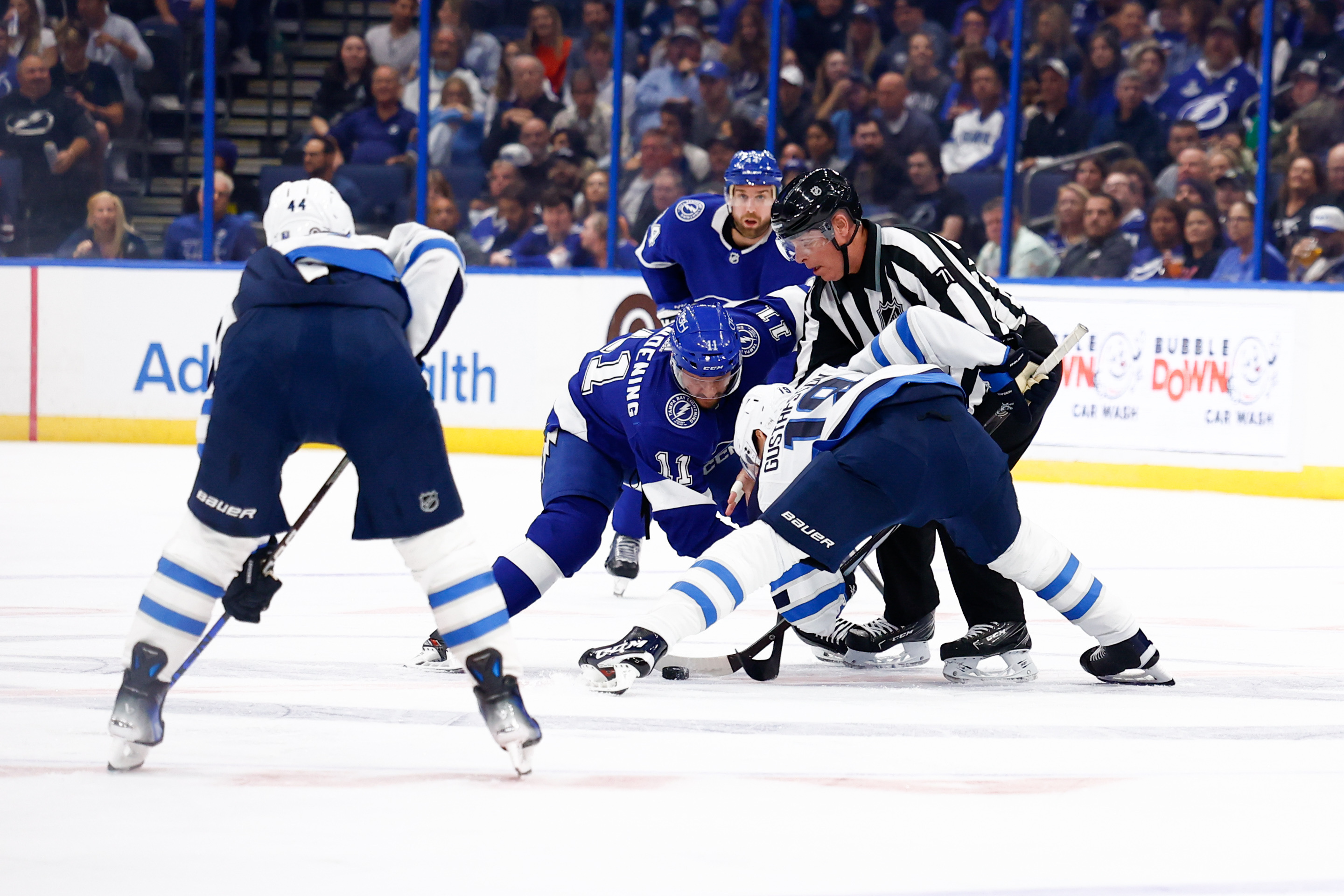 Adam Lowry leads Jets past Lightning in overtime | Reuters
