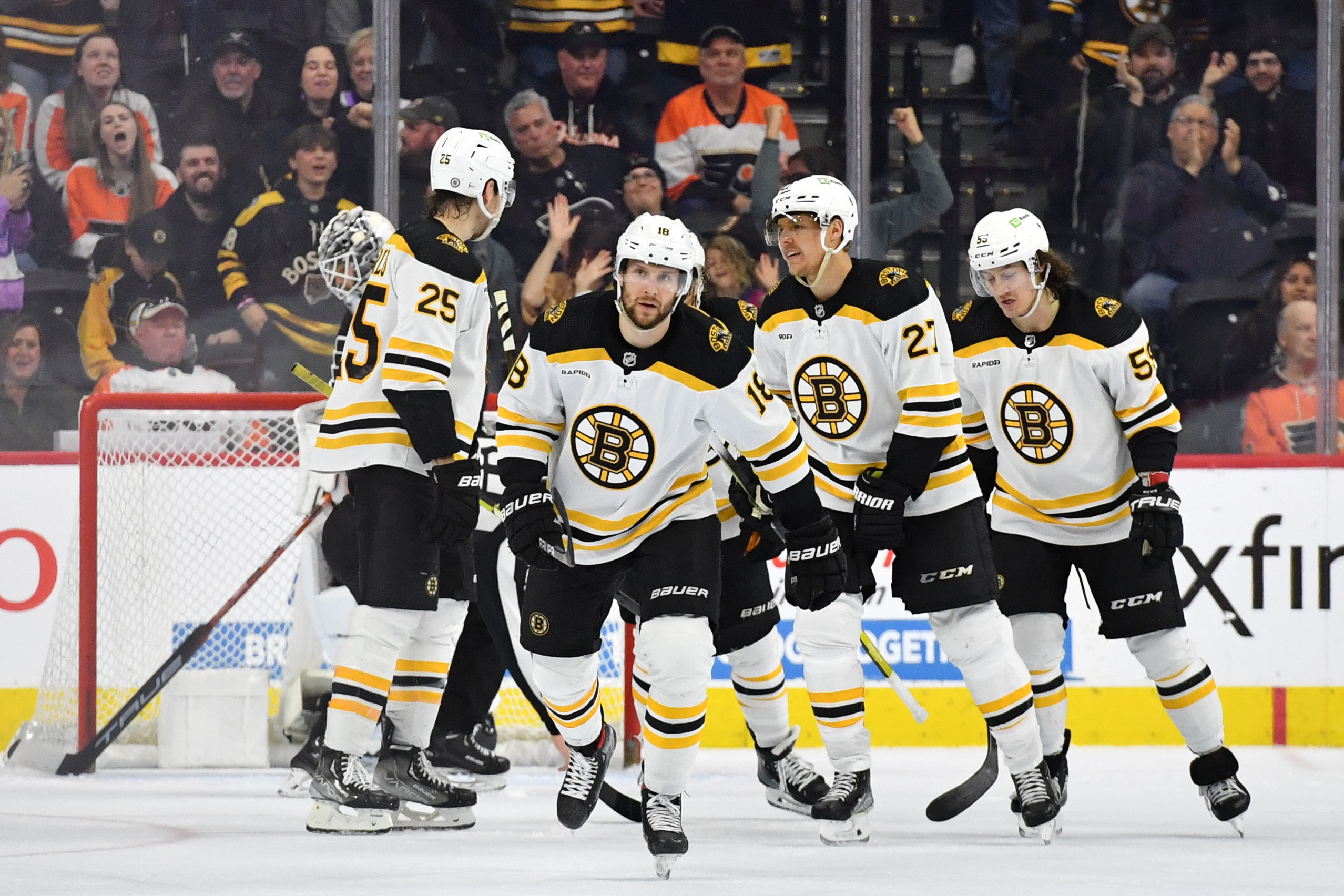 Bruins clip Flyers for NHL-record 63rd win | Reuters