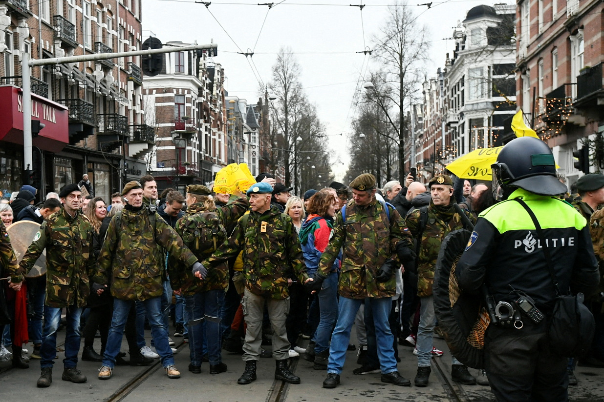 Dutch police disperse anti-lockdown protesters in Amsterdam | Reuters