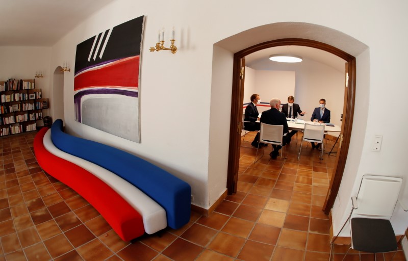 Macron says COVID-19 epidemic is serious in overseas territories. | Reuters