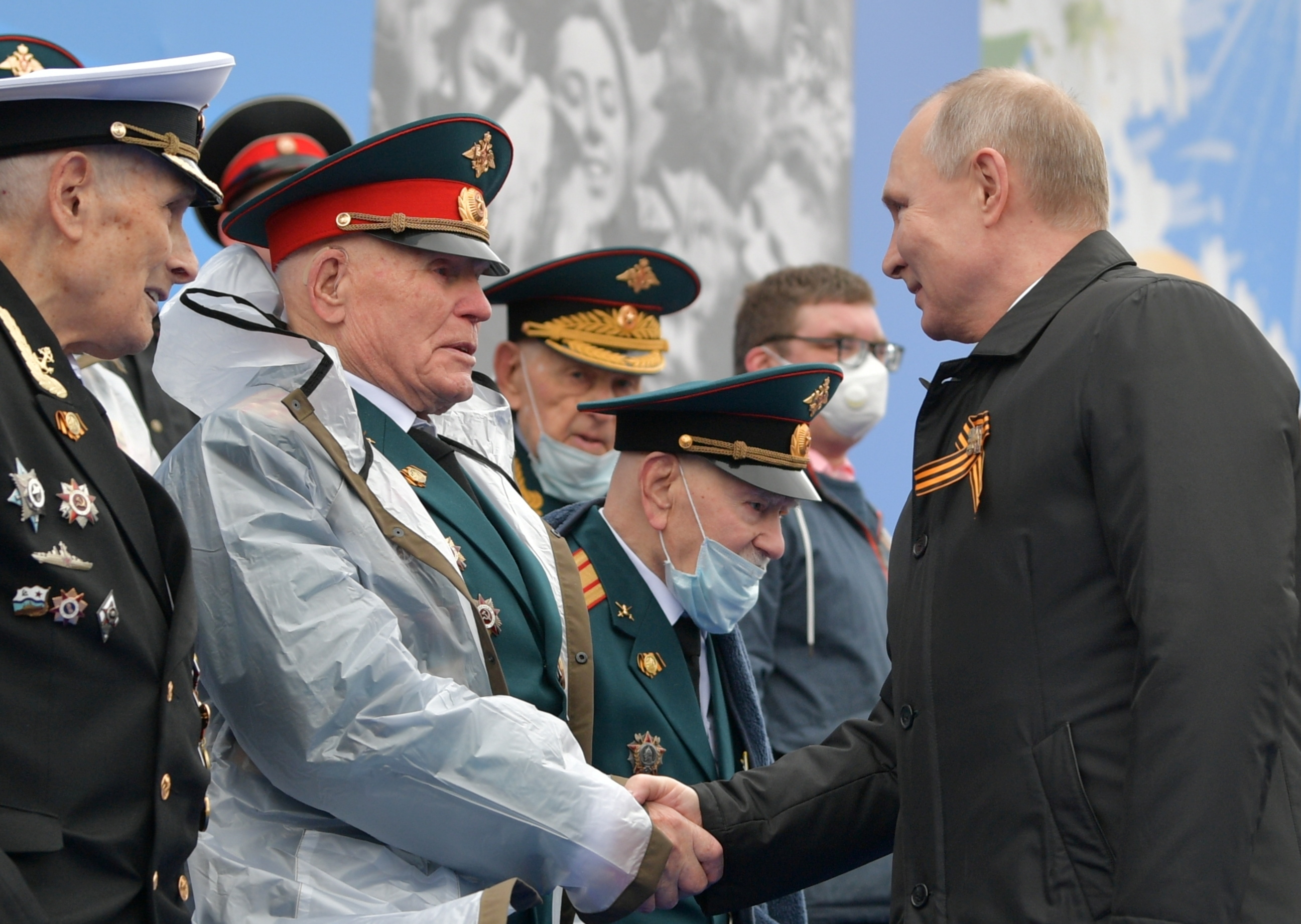 Putin reviews Russian military might as tensions with West soar | Reuters