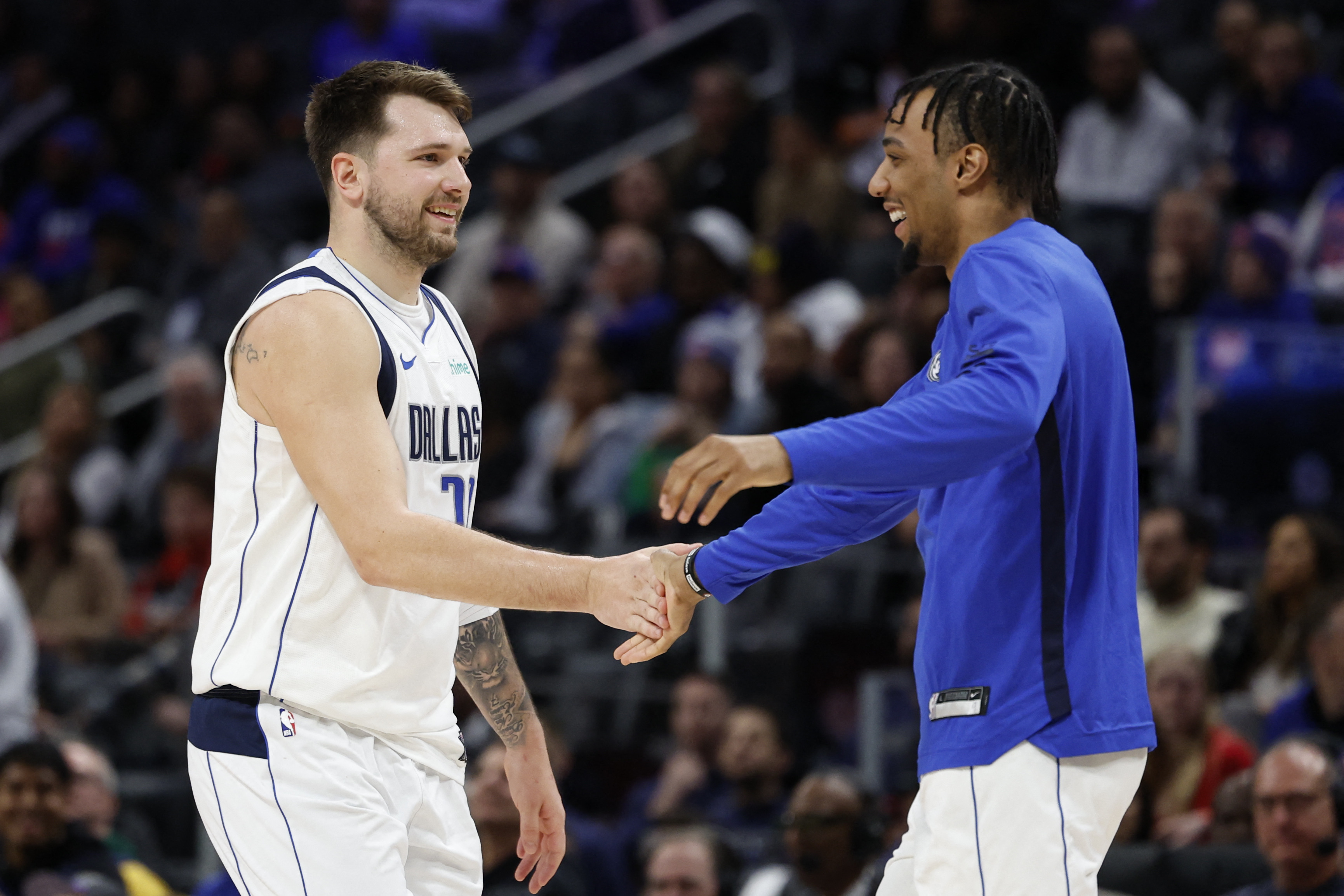 Luka Doncic sets triple-double mark as Mavs top Pistons | Reuters