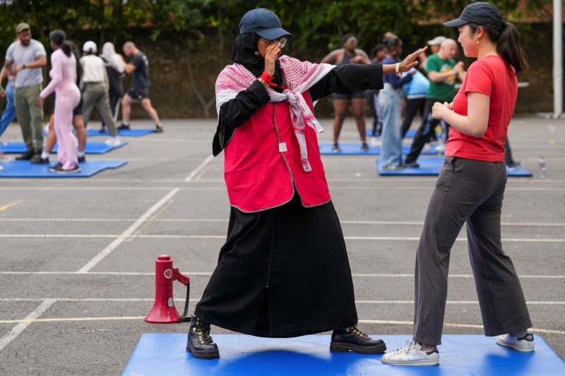 UK women of colour learn self-defence in response to racist riots | Reuters