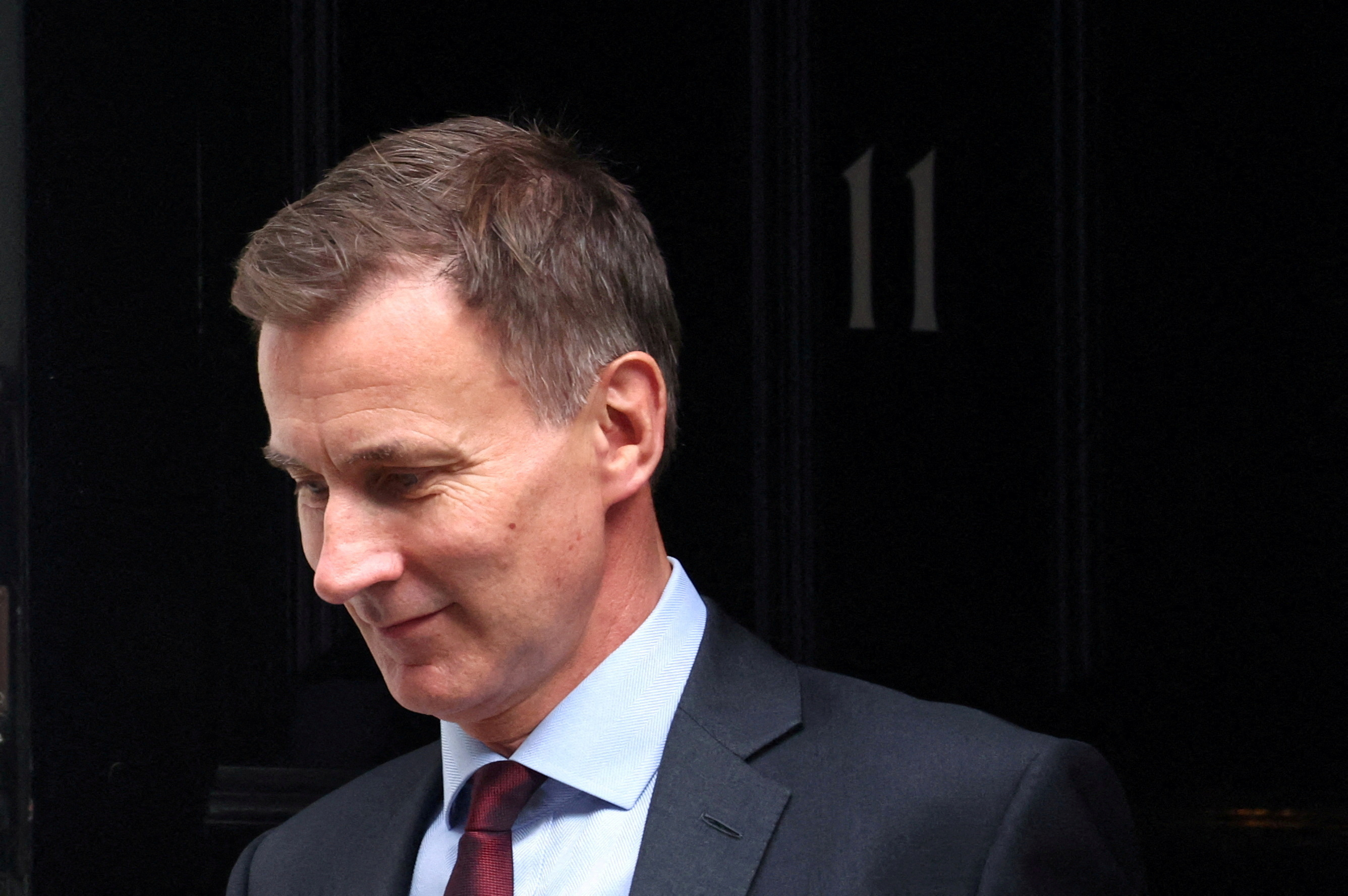 Autumn Statement: With eye on election, UK's Hunt cuts taxes in bid to ...