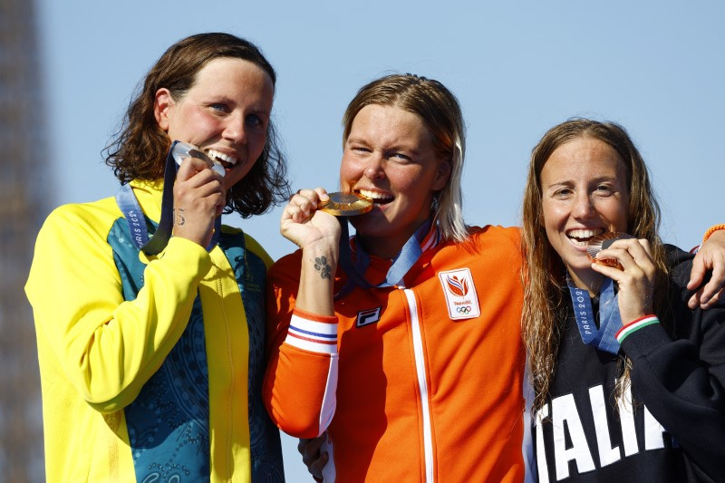 Swimming-Netherlands' Van Rouwendaal wins marathon gold after slog ...
