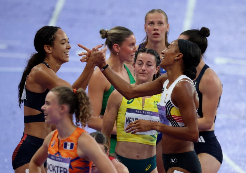 Athletics-Belgian Thiam wins third straight heptathlon gold | Reuters