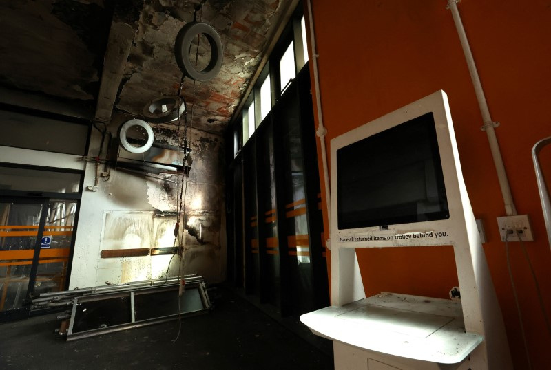 'Fight back': Wrecked Liverpool library stands defiant against UK riots ...