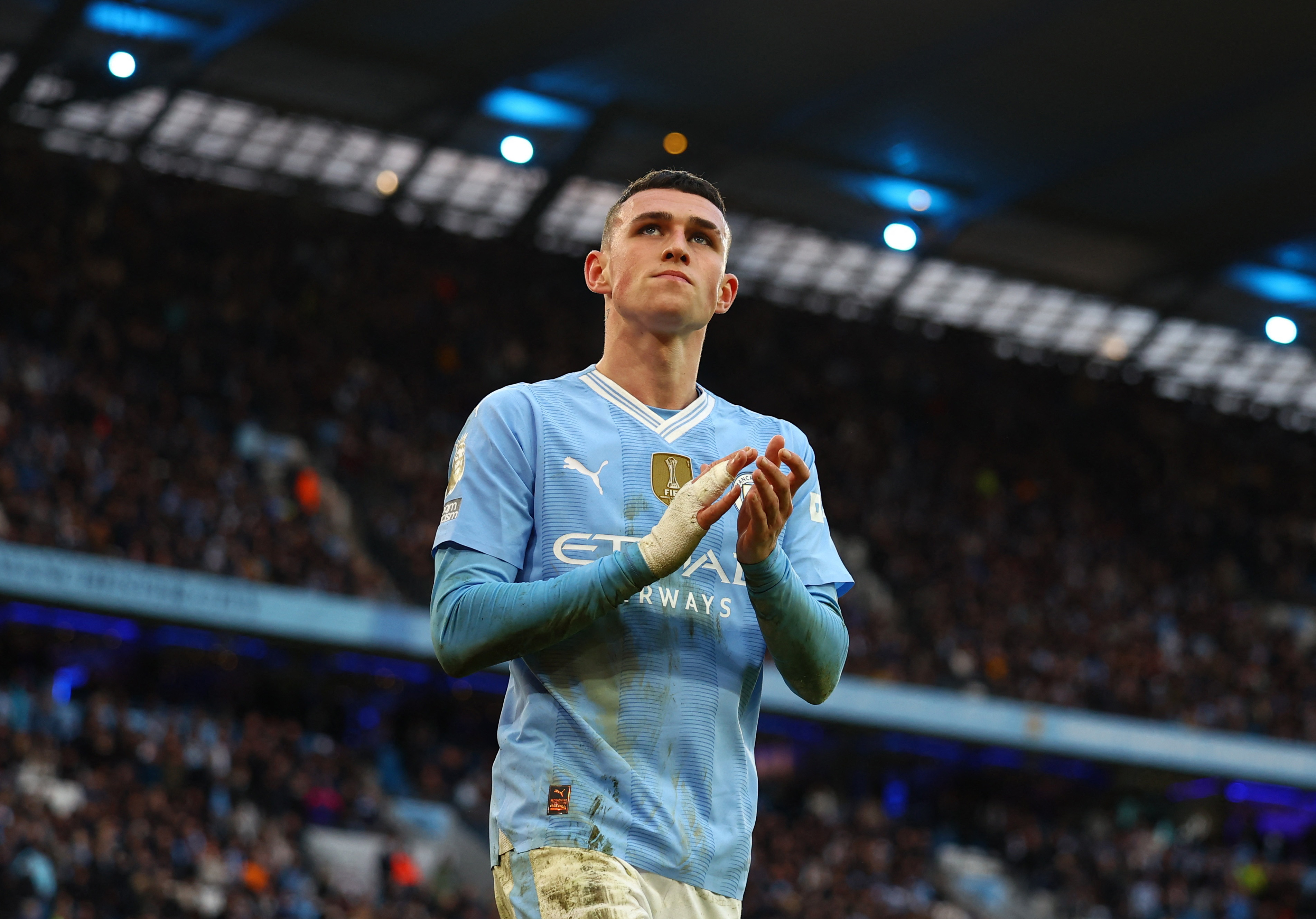 Foden double fires Man City to comeback win against Man Utd | Reuters