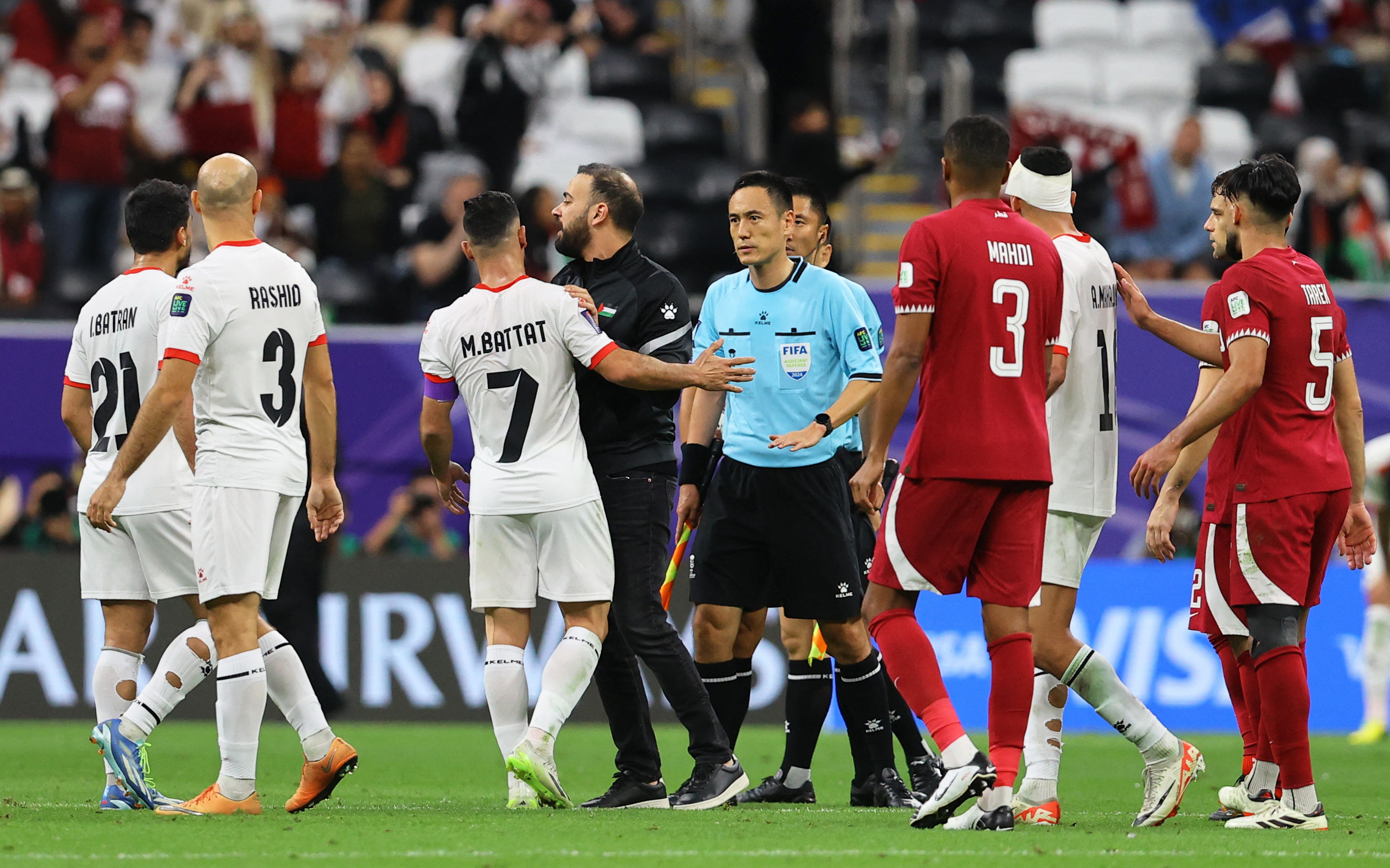 Holders Qatar knock Palestine out of Asian Cup to secure last-eight ...