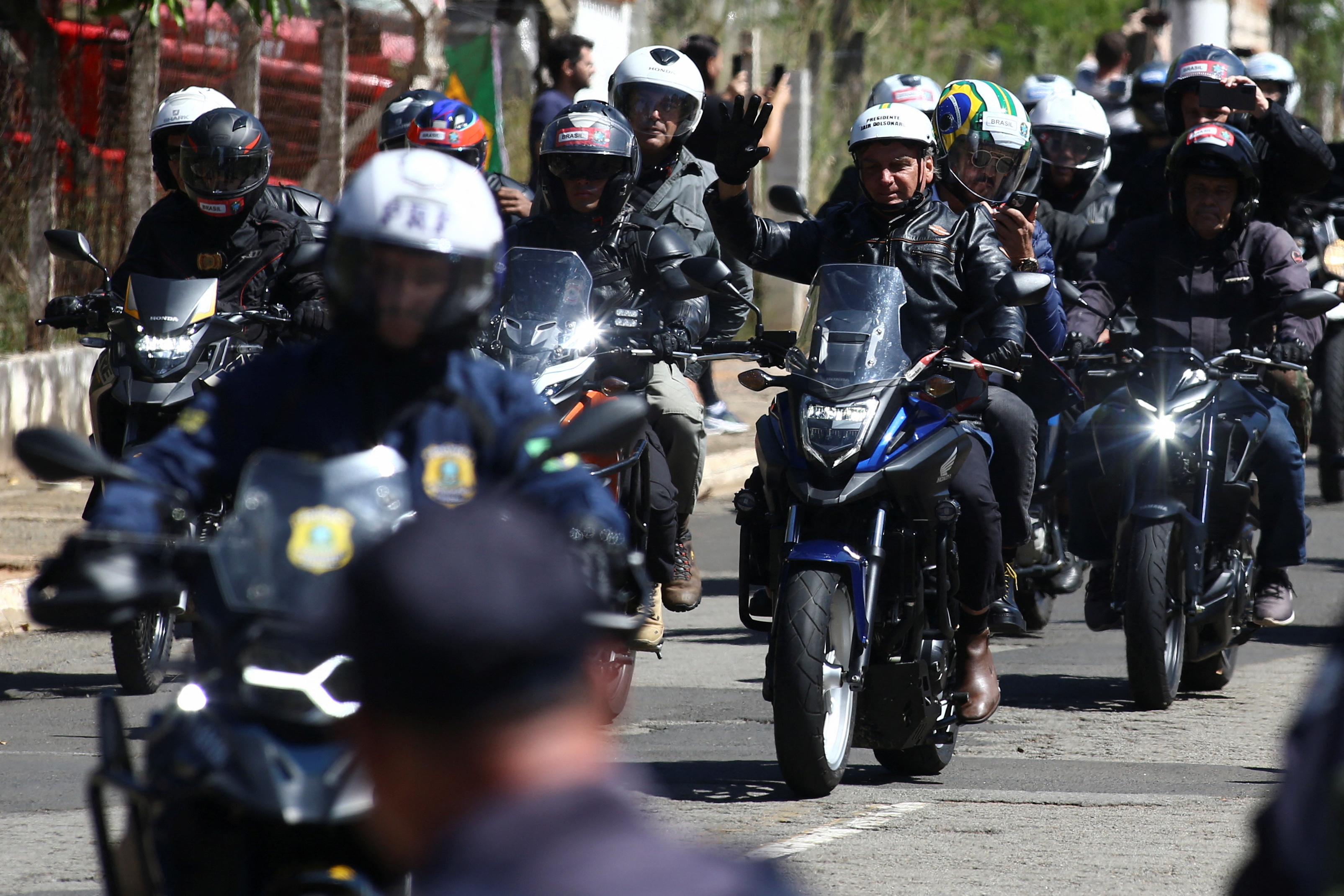 Brazil's President Bolsonaro leads massive motorcade rally in Sao Paulo ...