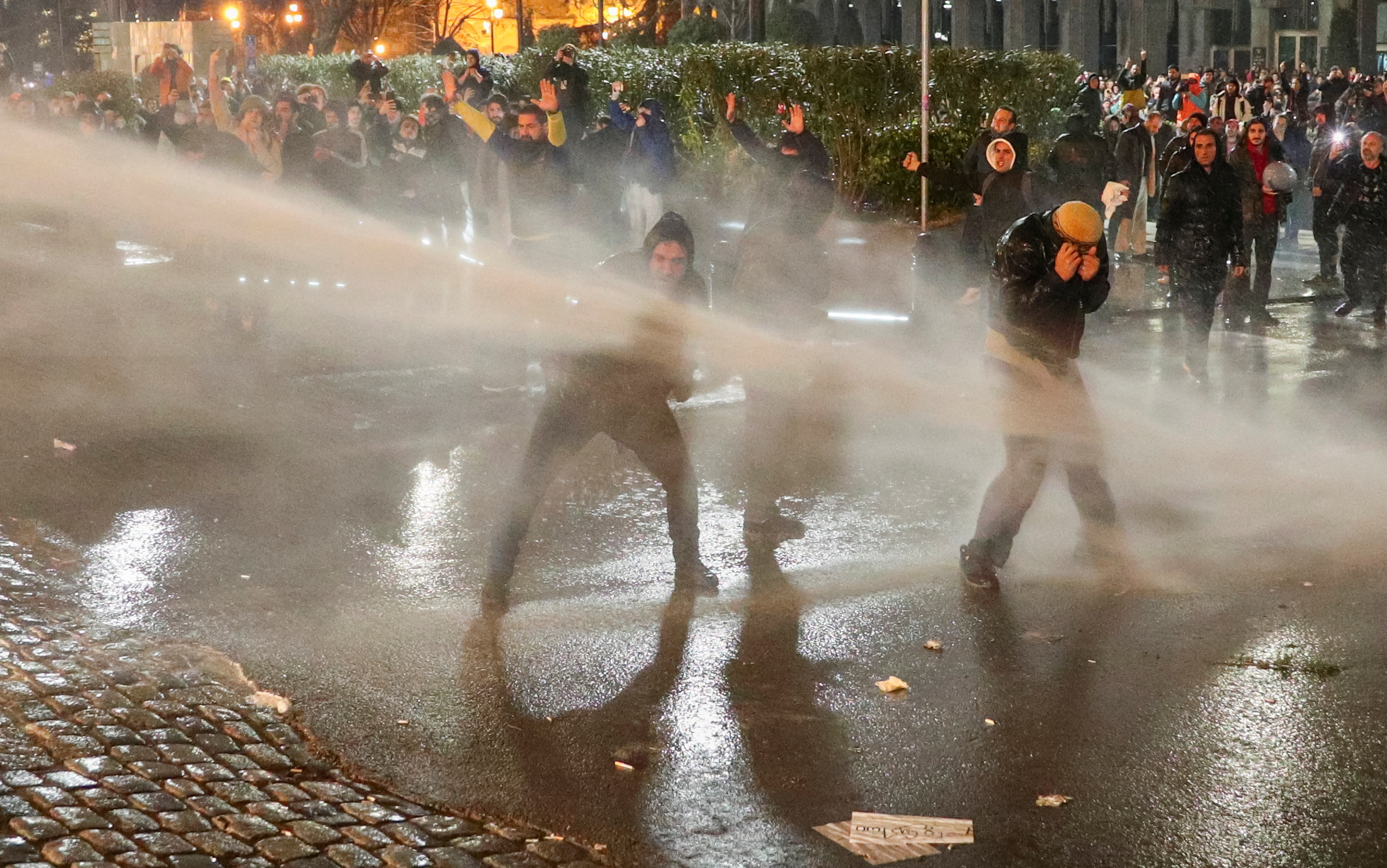 Georgians throw stones, petrol bombs at police in protest over new law ...
