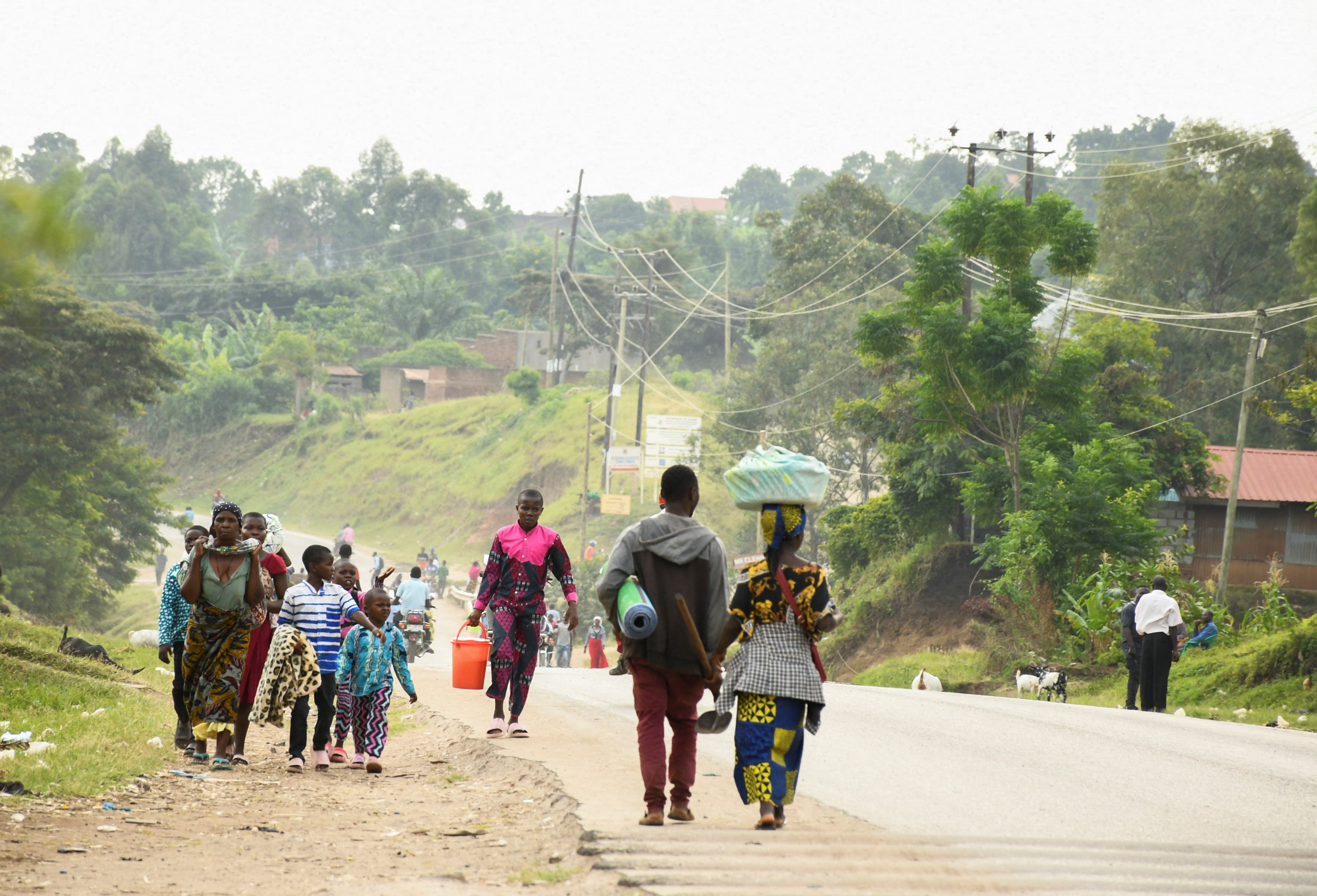 Militants kill 37, abduct six others in attack on Ugandan school | Reuters
