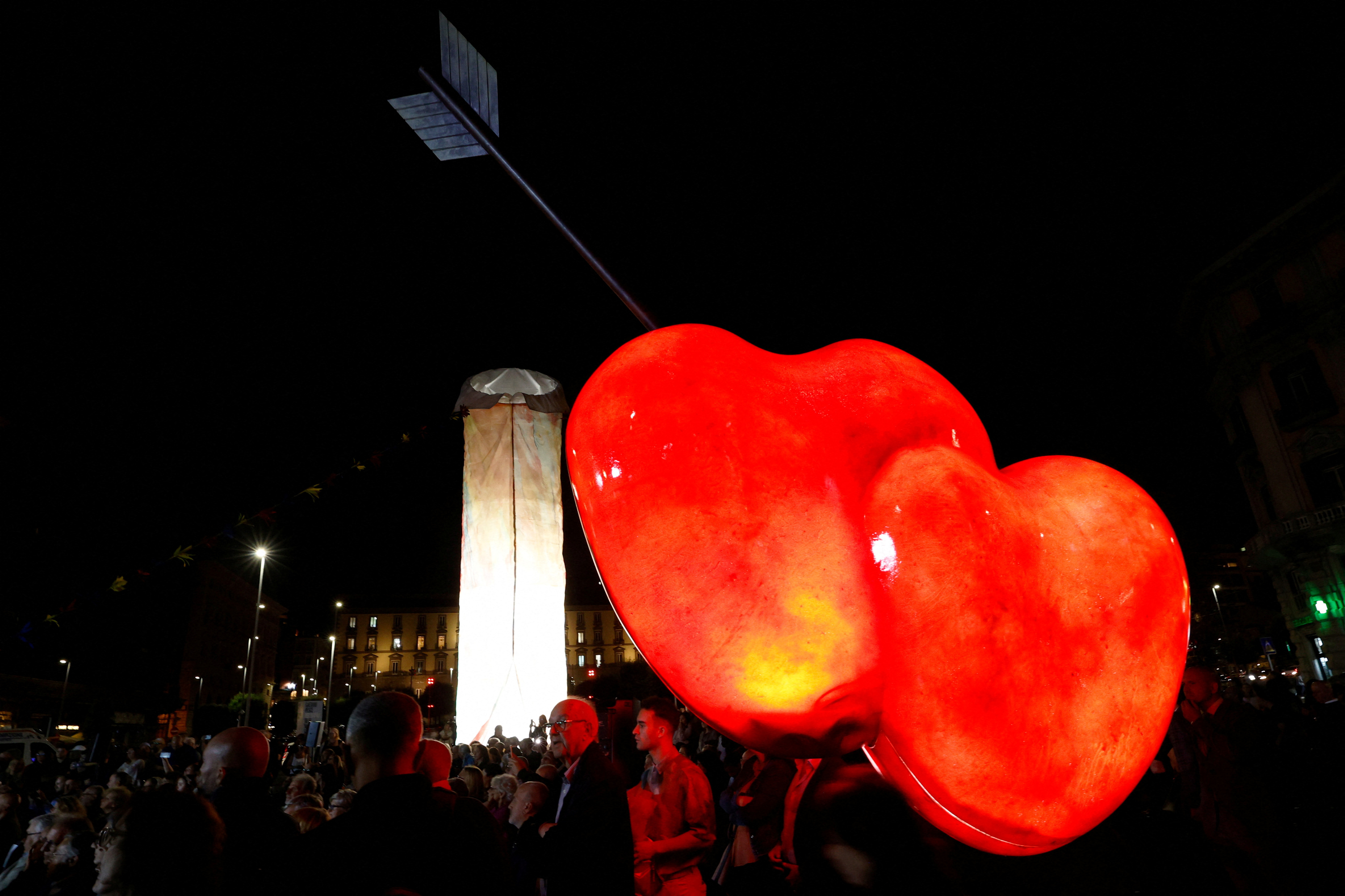 Phallic 12-metre art installation raises eyebrows in Naples | Reuters