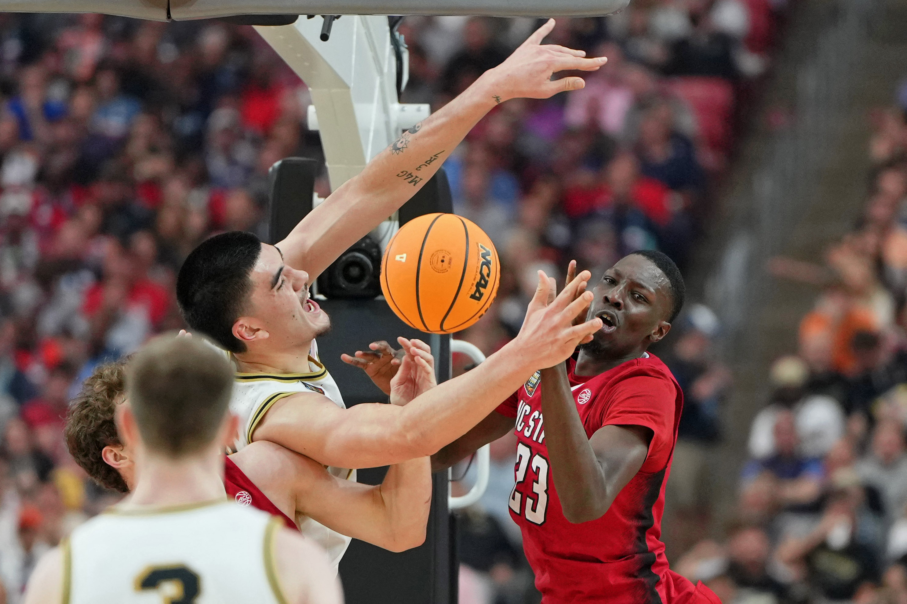 No. 1 seed Purdue advances to title game, 63-50 over NC State | Reuters