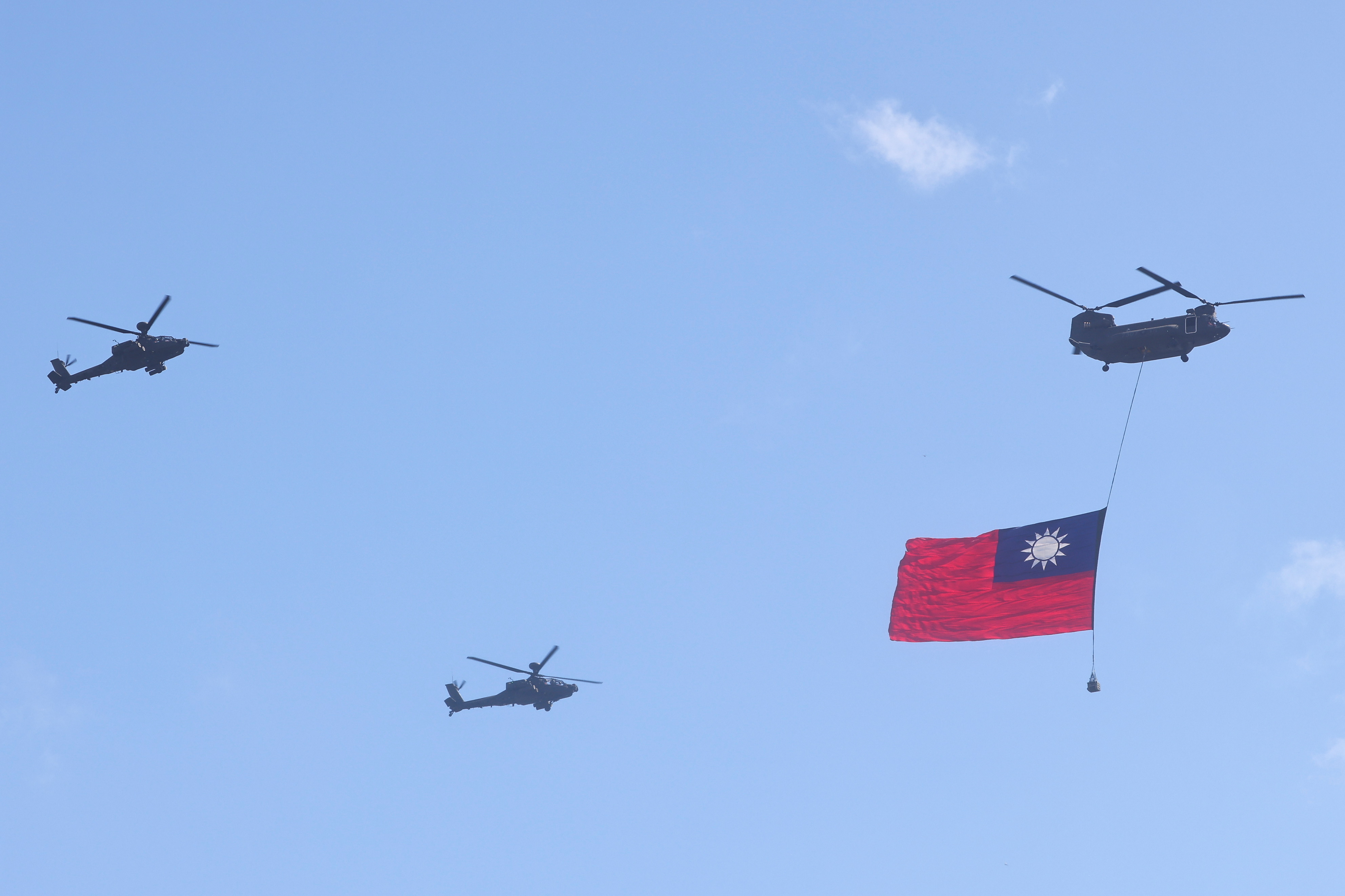 Taiwan won't be forced to bow to China, president says | Reuters