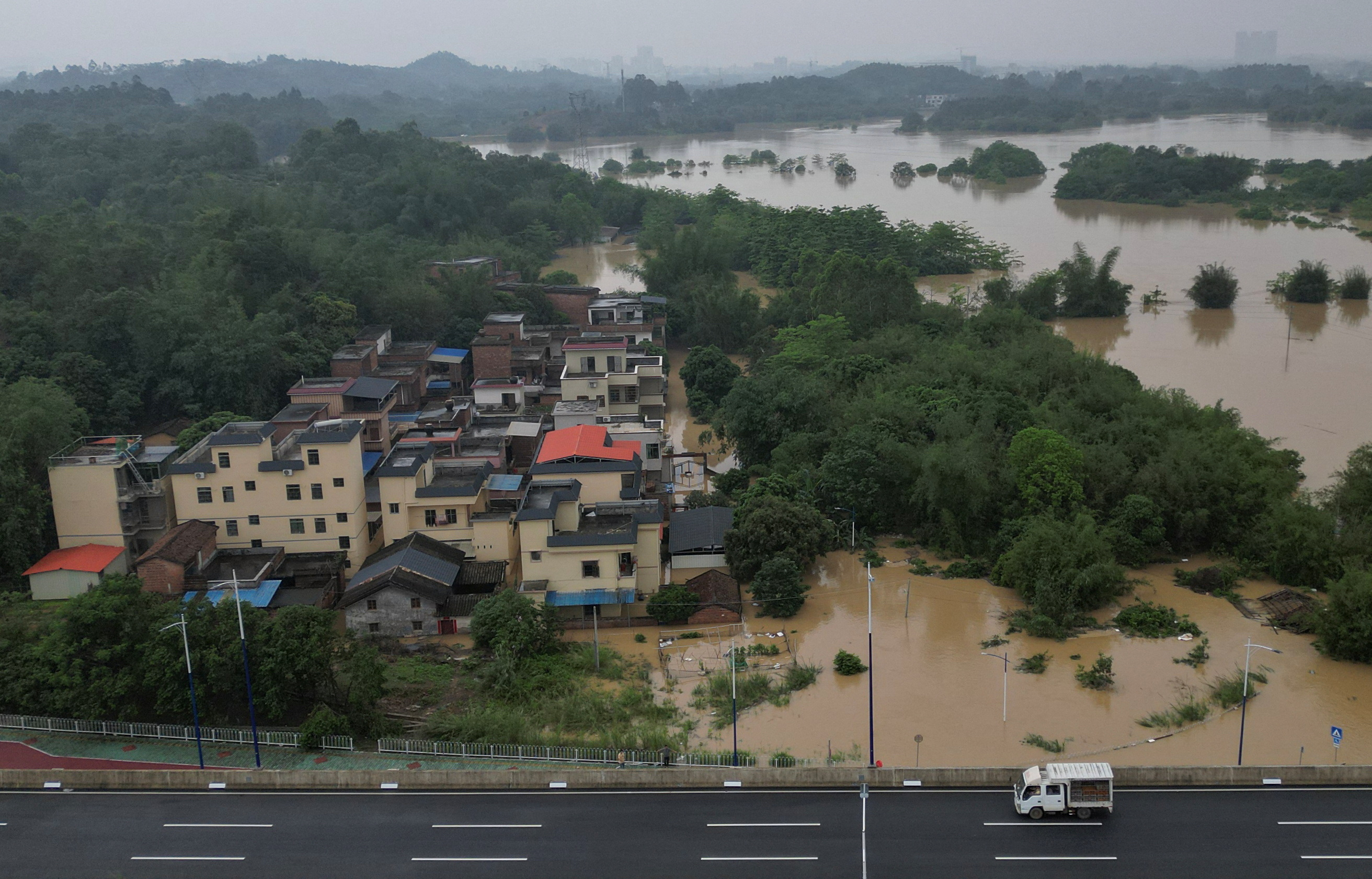 Floods swamp southern China, spark extreme weather fears | Reuters