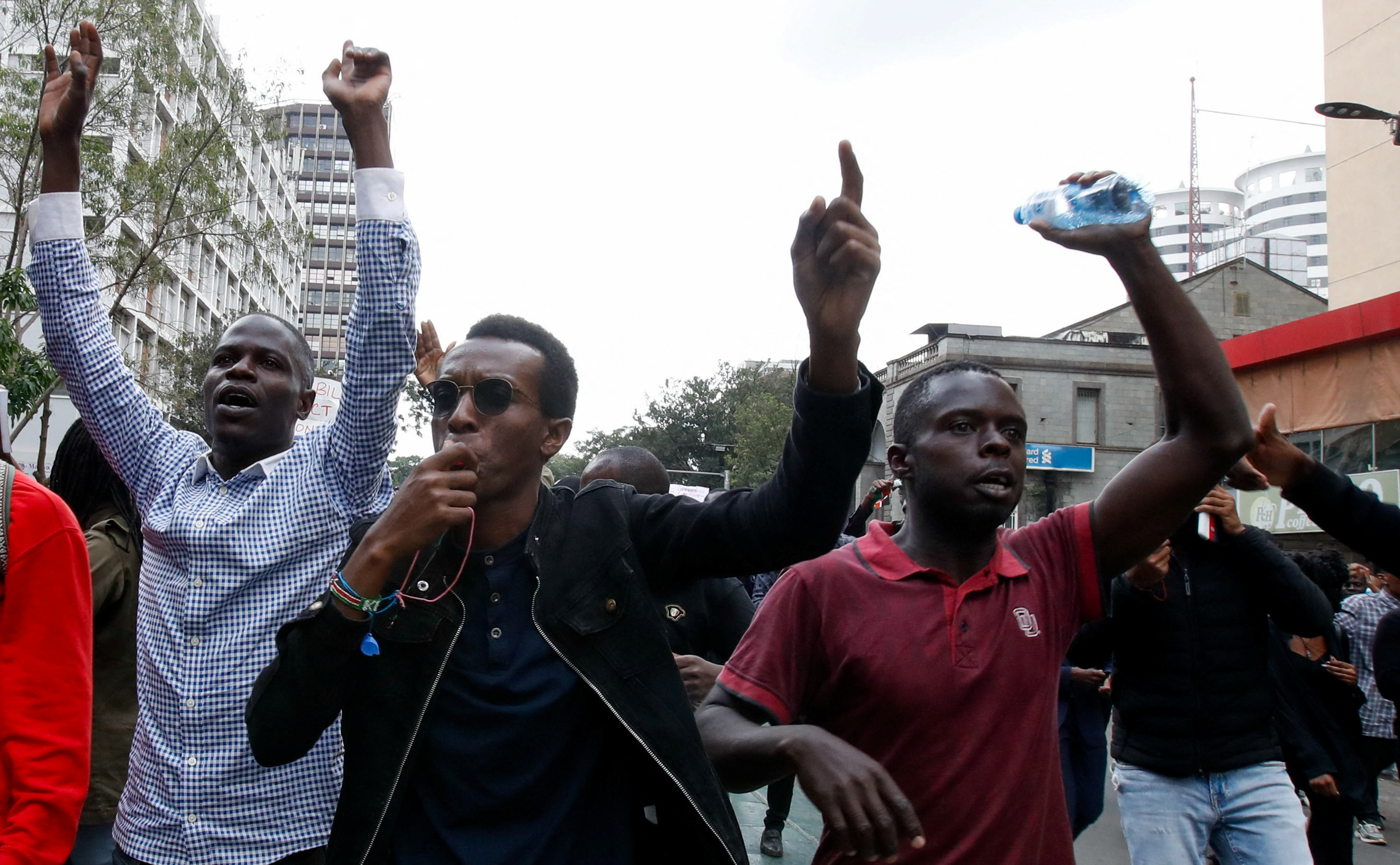 Protesters march in cities across Kenya against planned tax rises | Reuters