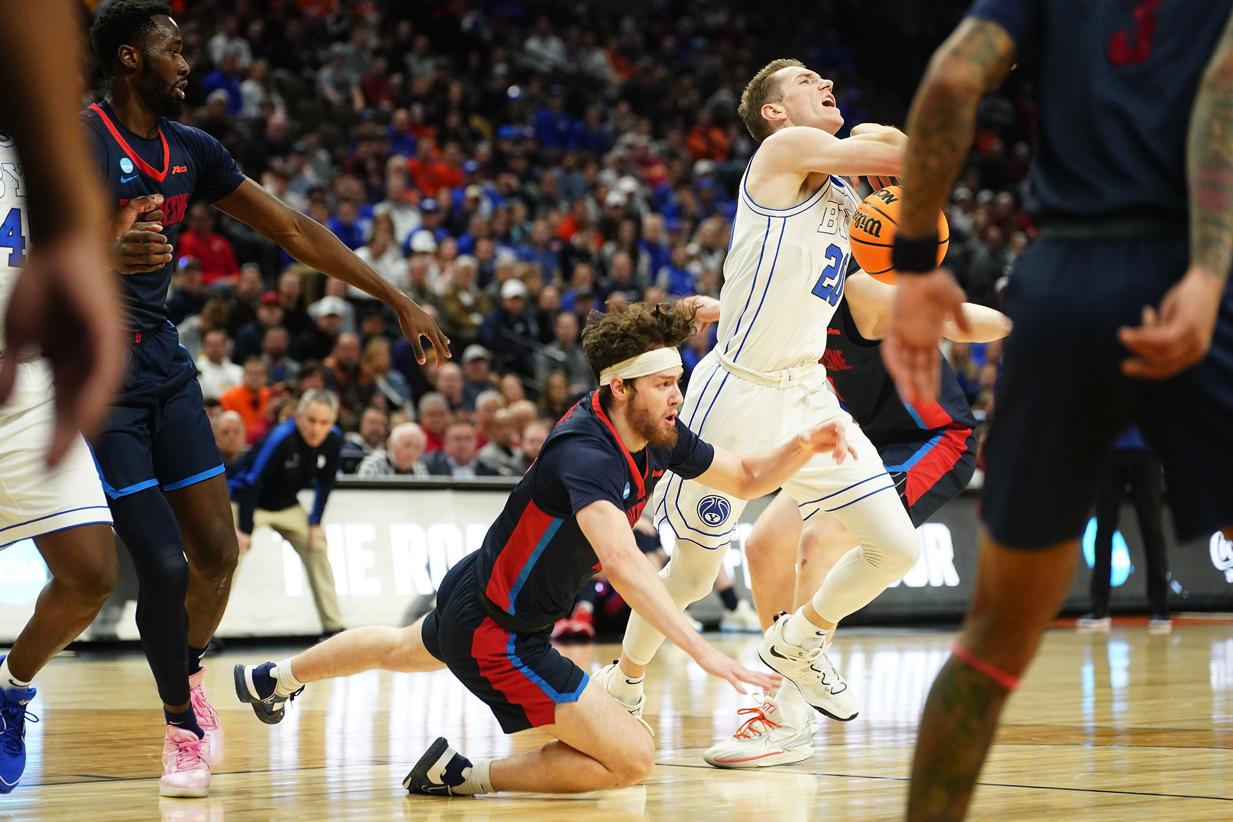Duquesne upsets BYU for first NCAA tourney win in 55 years | Reuters