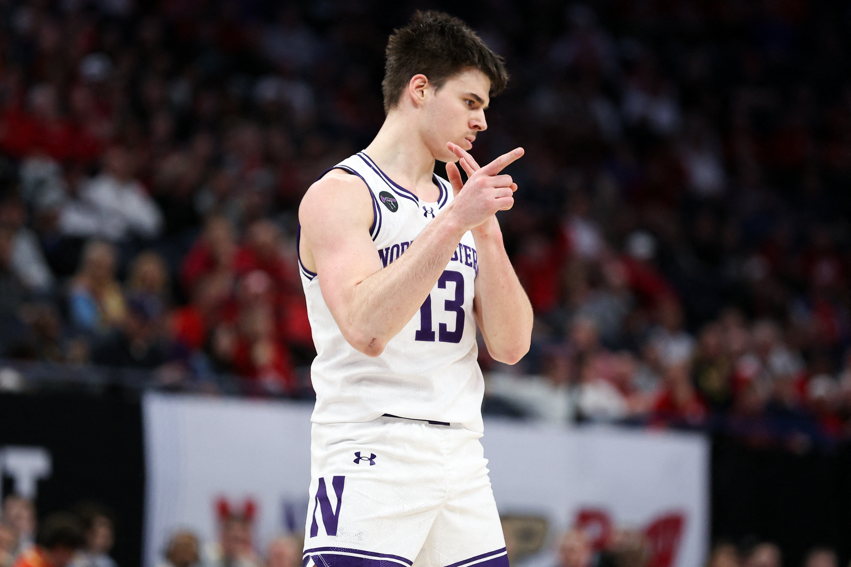 AJ Storr paces Wisconsin past Northwestern and into Big Ten semis | Reuters