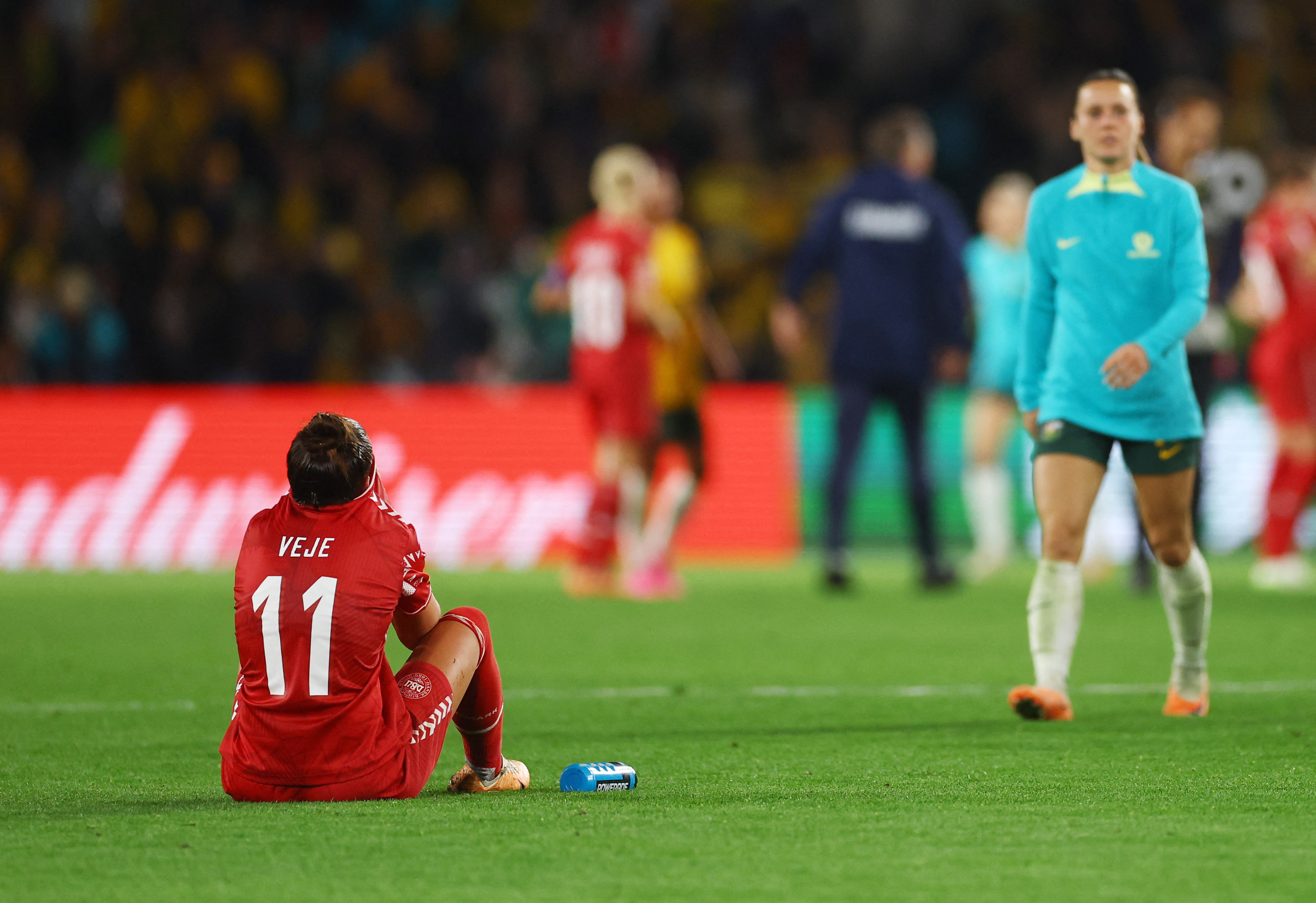 Kerr returns as Australia down Danes to reach quarters | Reuters