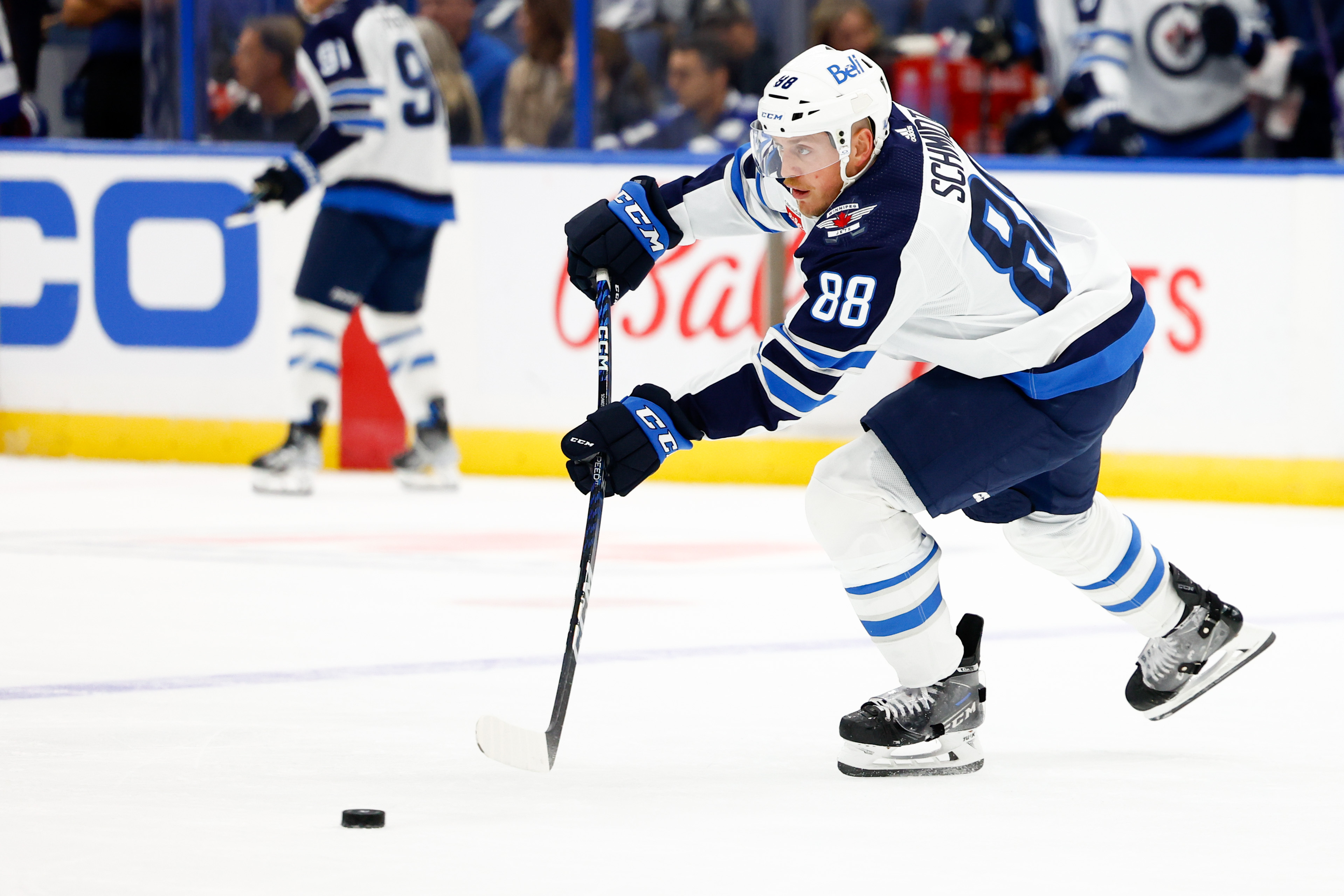 Adam Lowry leads Jets past Lightning in overtime | Reuters