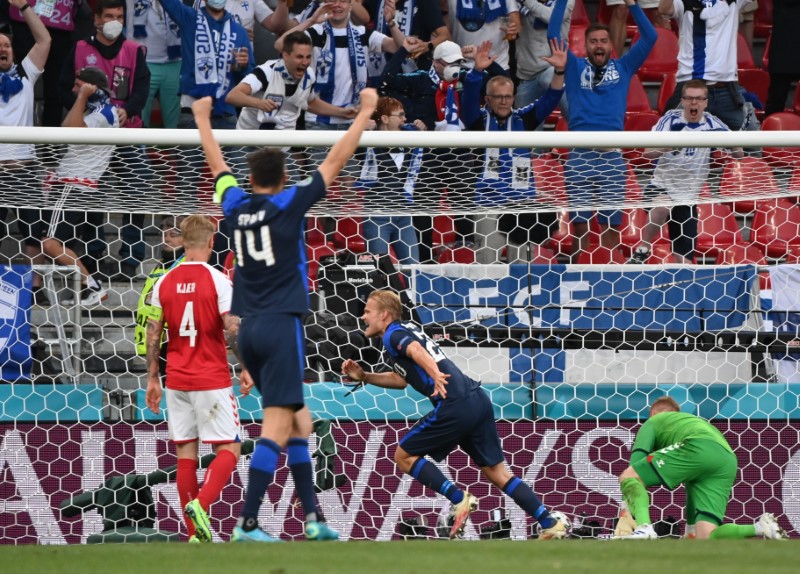Denmark game overshadowed by Eriksen collapse as Finns win 1-0 | Reuters