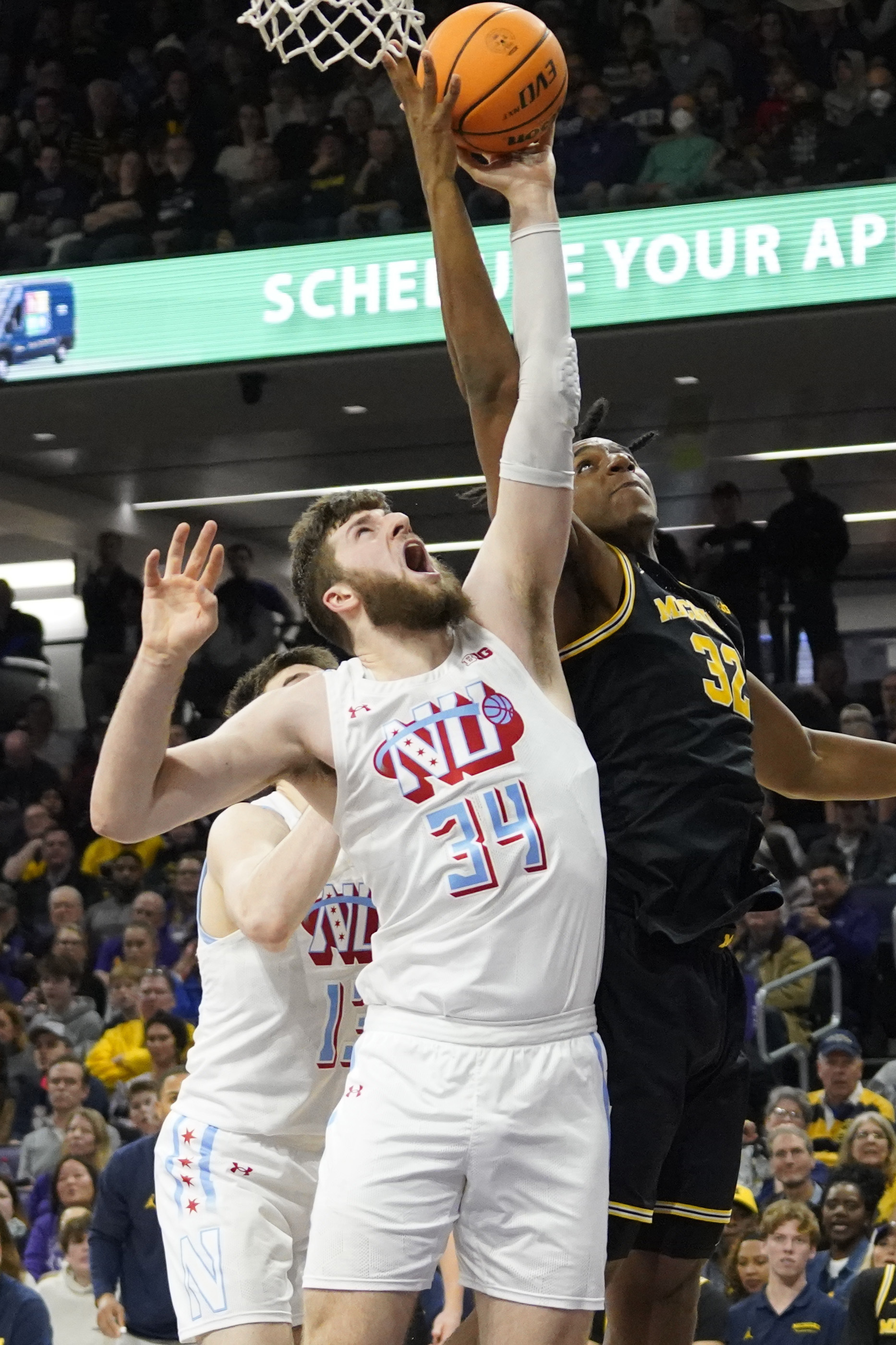 Boo Buie gets record, Northwestern gets win over Michigan | Reuters