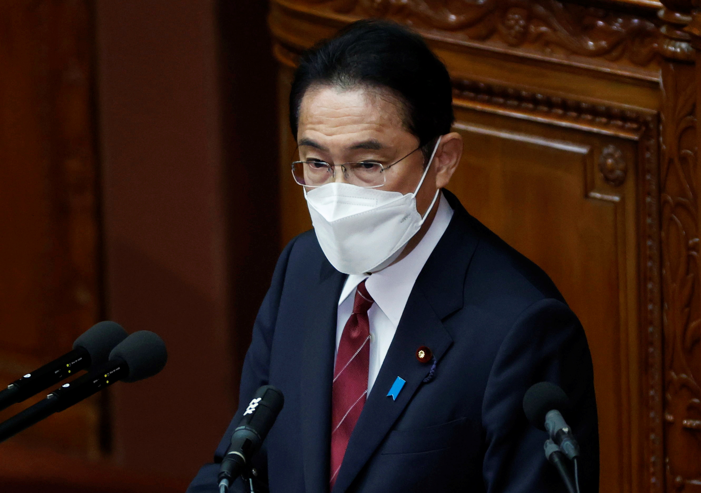 Japan to review budget balance timing early next year -PM Kishida | Reuters