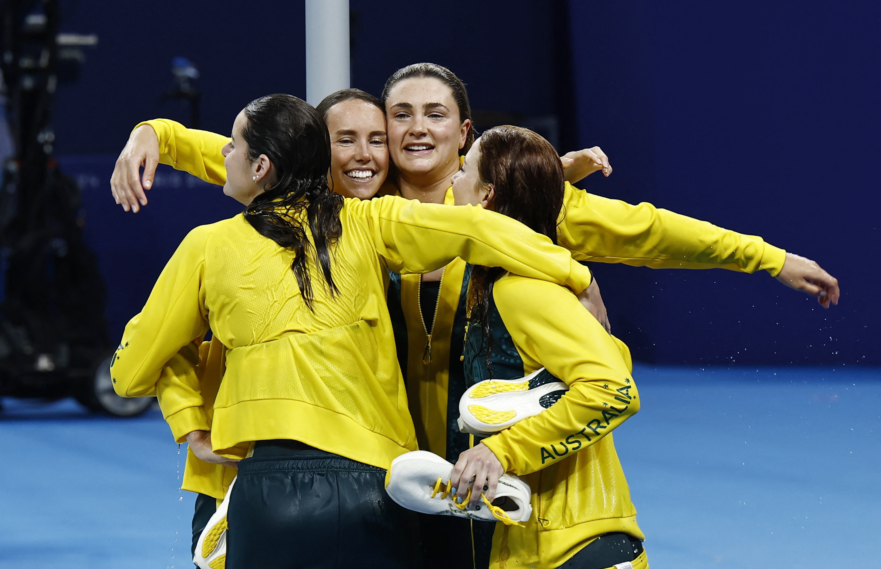 Australia jump for joy despite falling short of US | Reuters