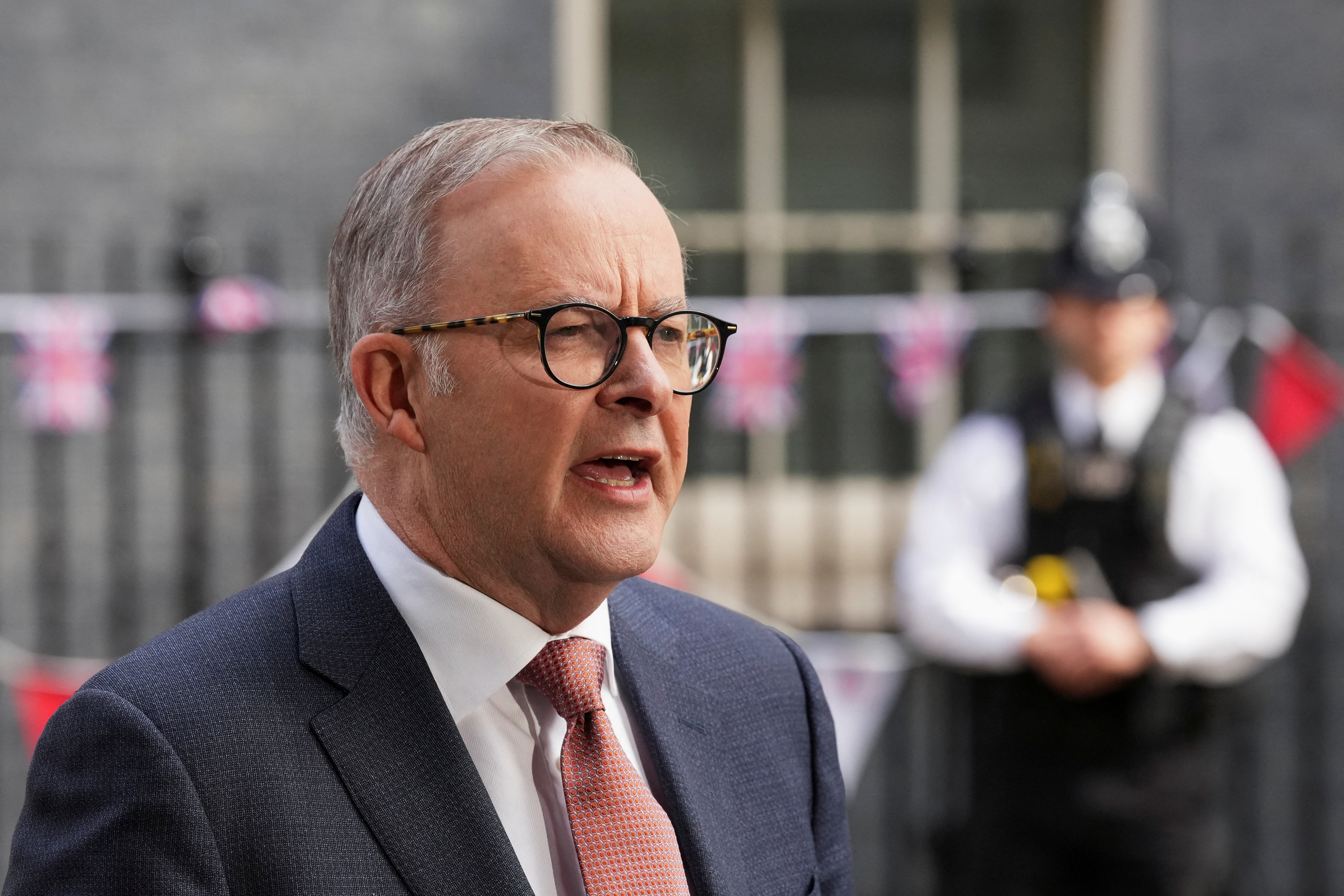 Australia PM vows to introduce bill to reshape tax cuts within weeks ...