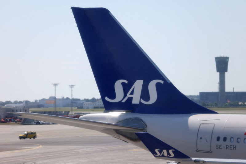 Strike-hit SAS passenger count fell 32% in July from June | Reuters