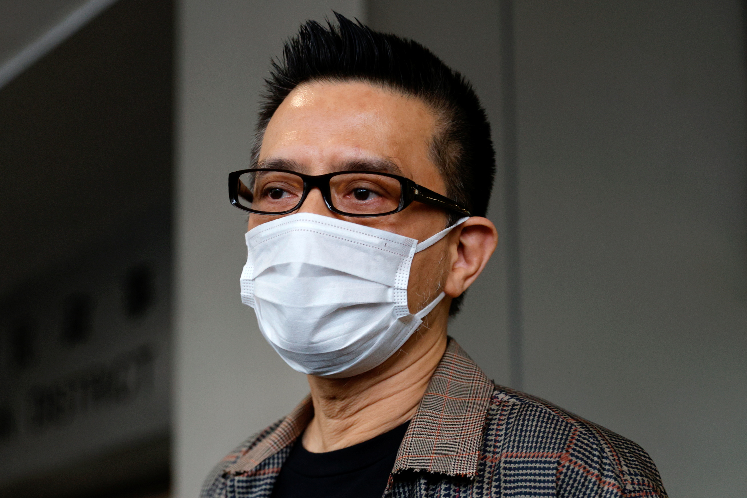 Hong Kong activist singer cleared of 'corrupt conduct' charge | Reuters