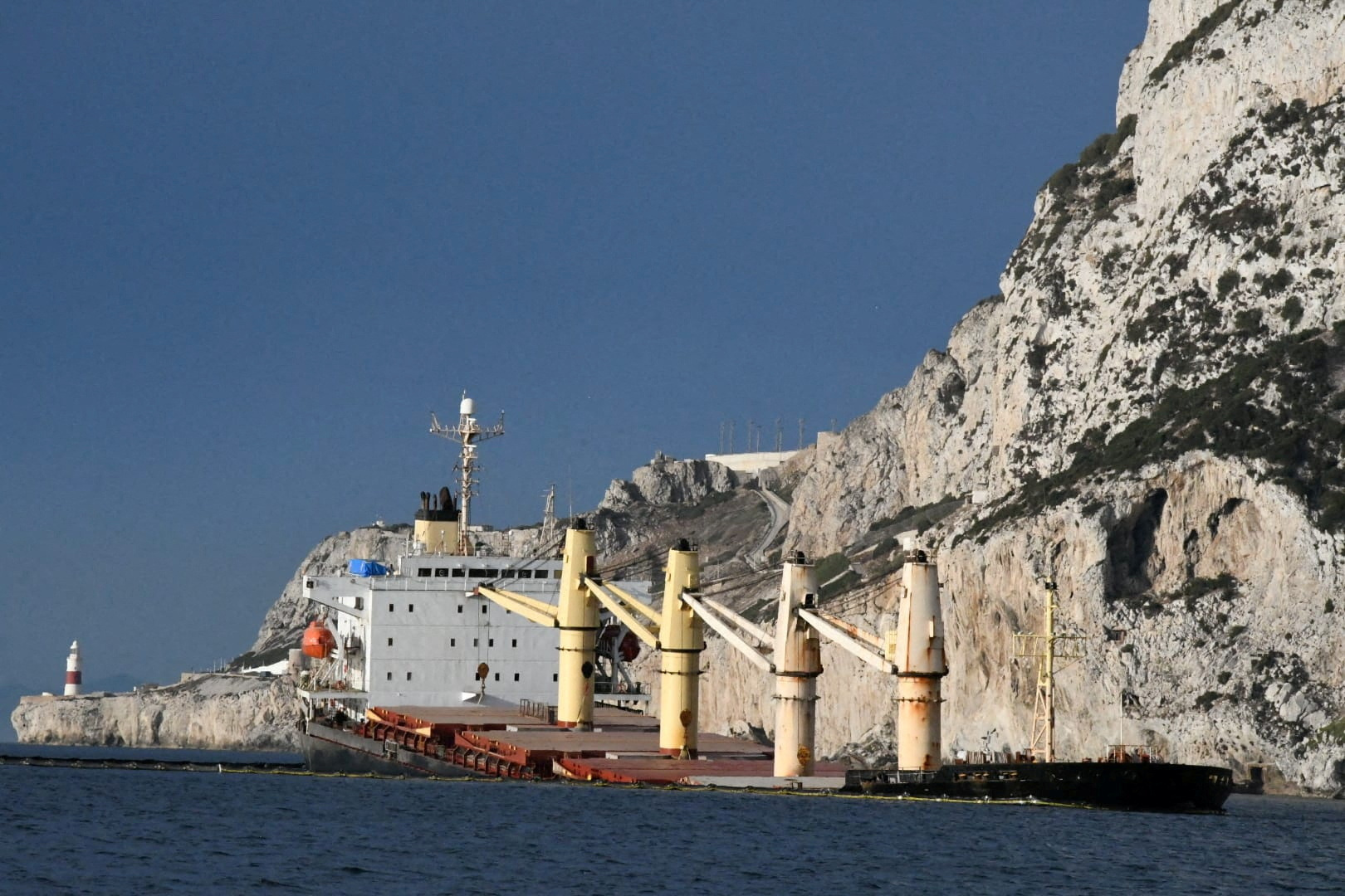 Divers seal tank vents leaking oil from bulk carrier off Gibraltar ...