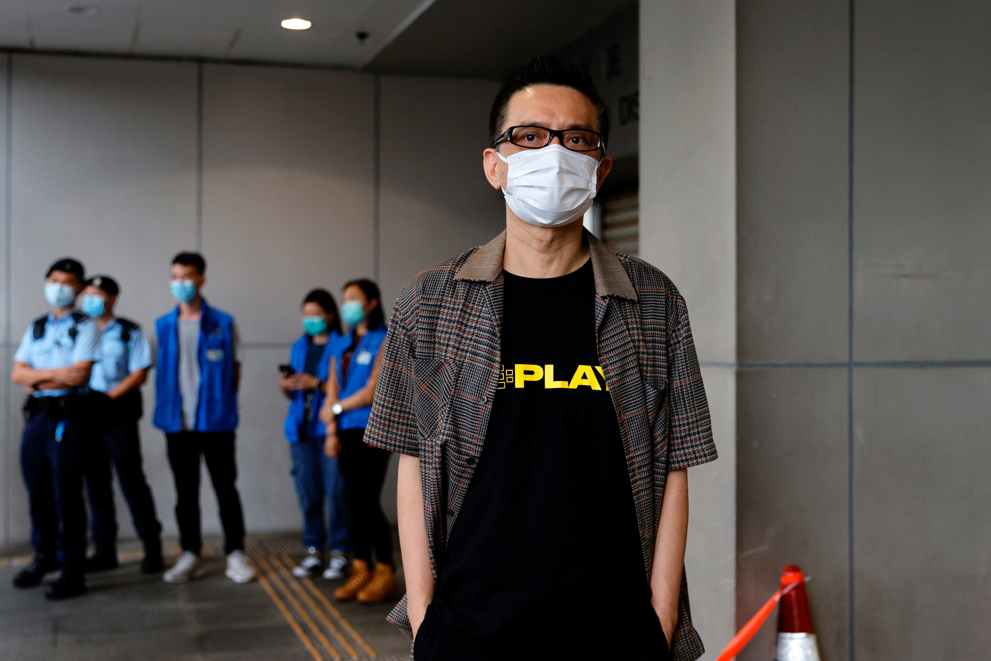 Hong Kong activist singer cleared of 'corrupt conduct' charge | Reuters