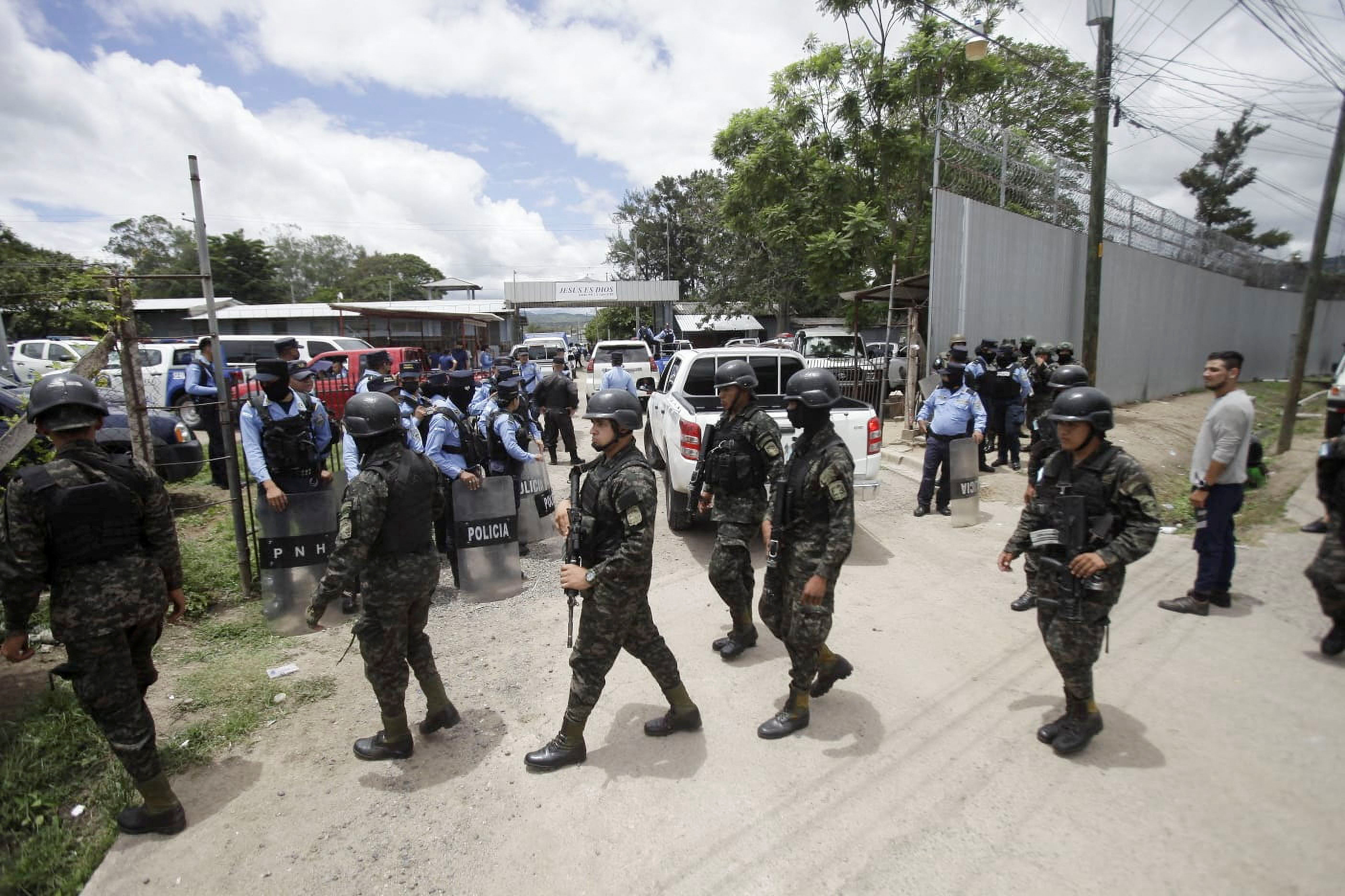 Honduran families seek answers as prison riot deaths rise to 46 | Reuters