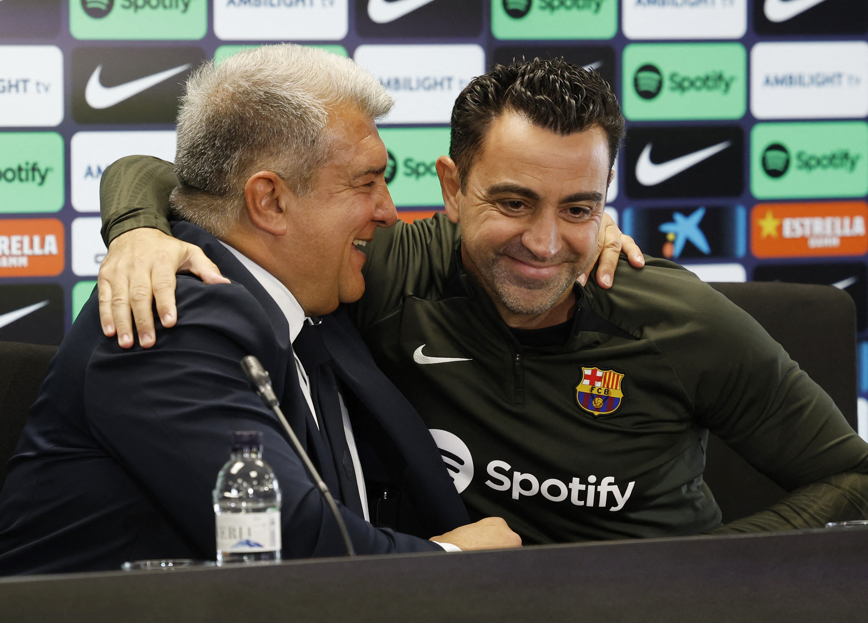 Xavi says Barca project behind decision to stay, not money | Reuters