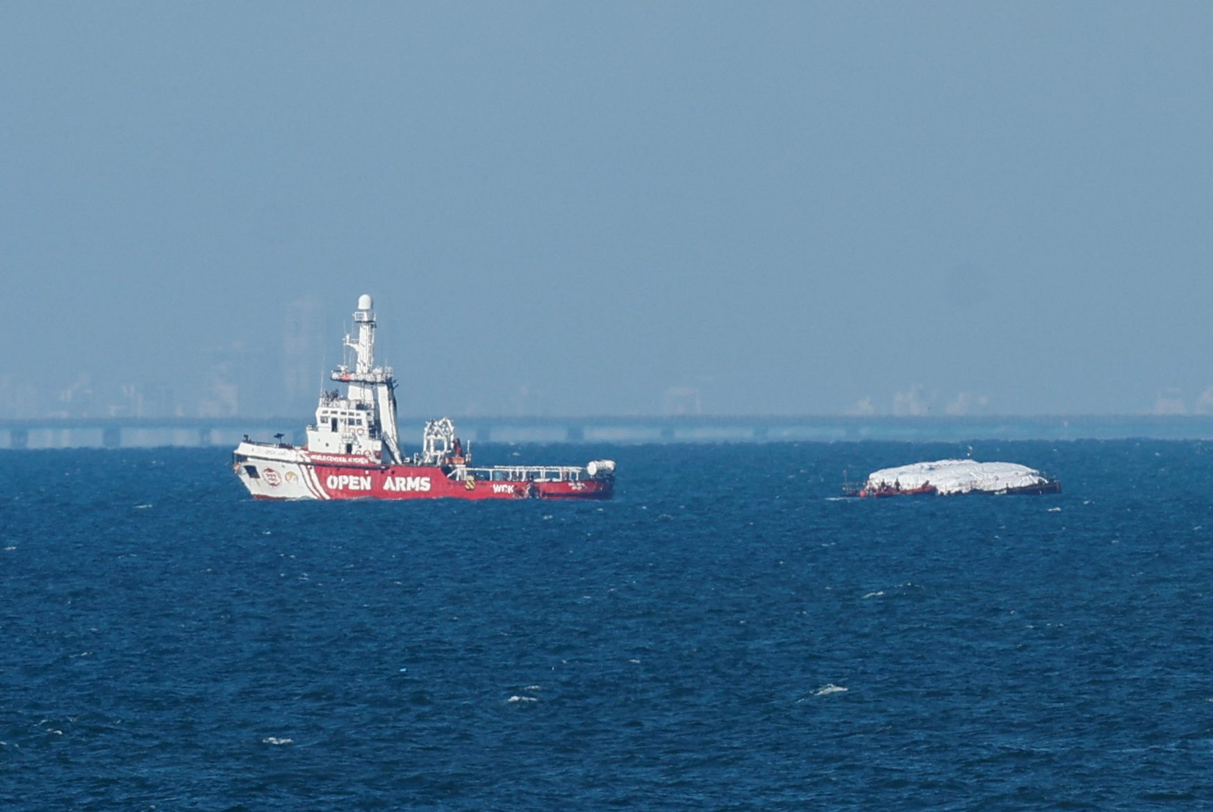 Aid supply ship from Cyprus reaches Gaza coast but weather slows ...