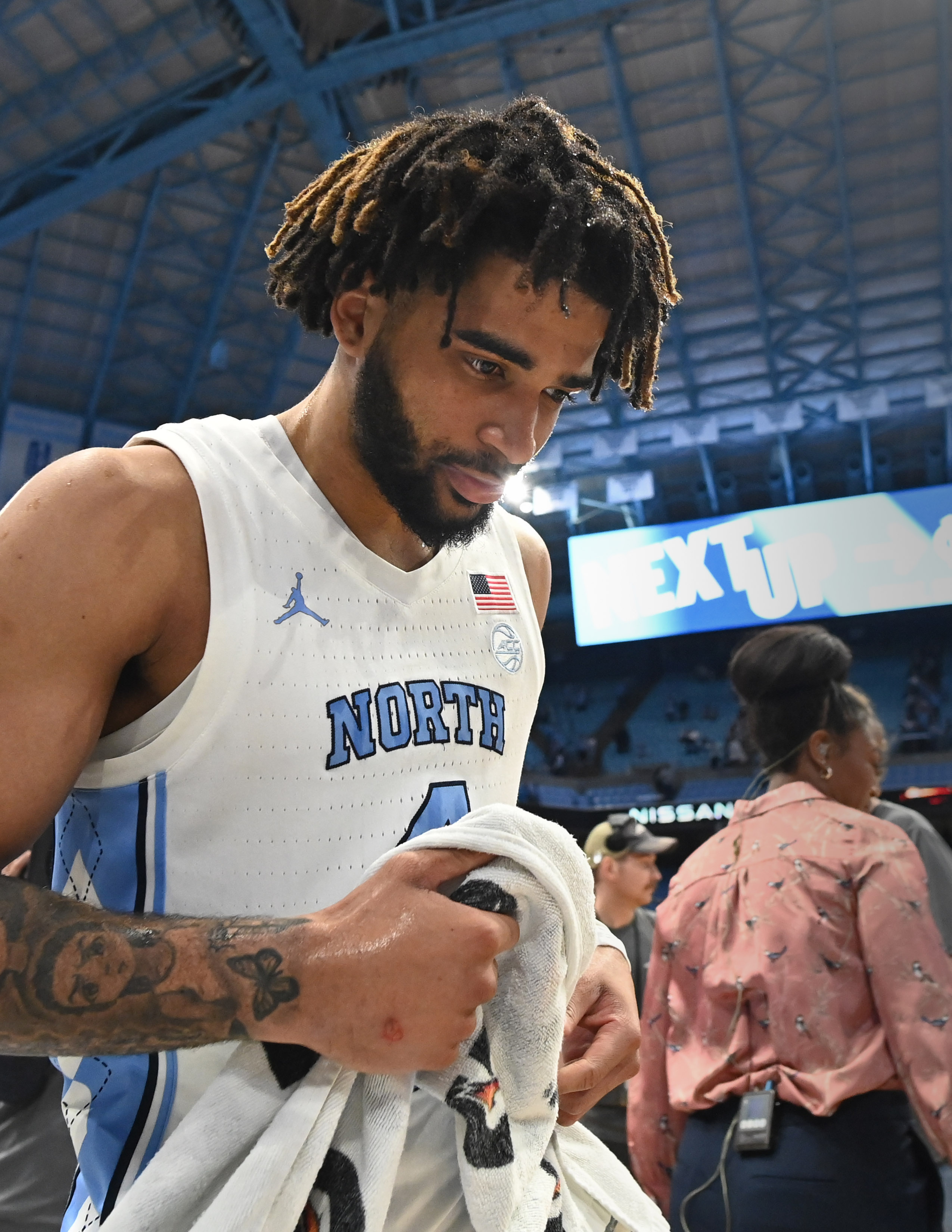 RJ Davis scores career-high 42, lifts No. 9 UNC past Miami | Reuters