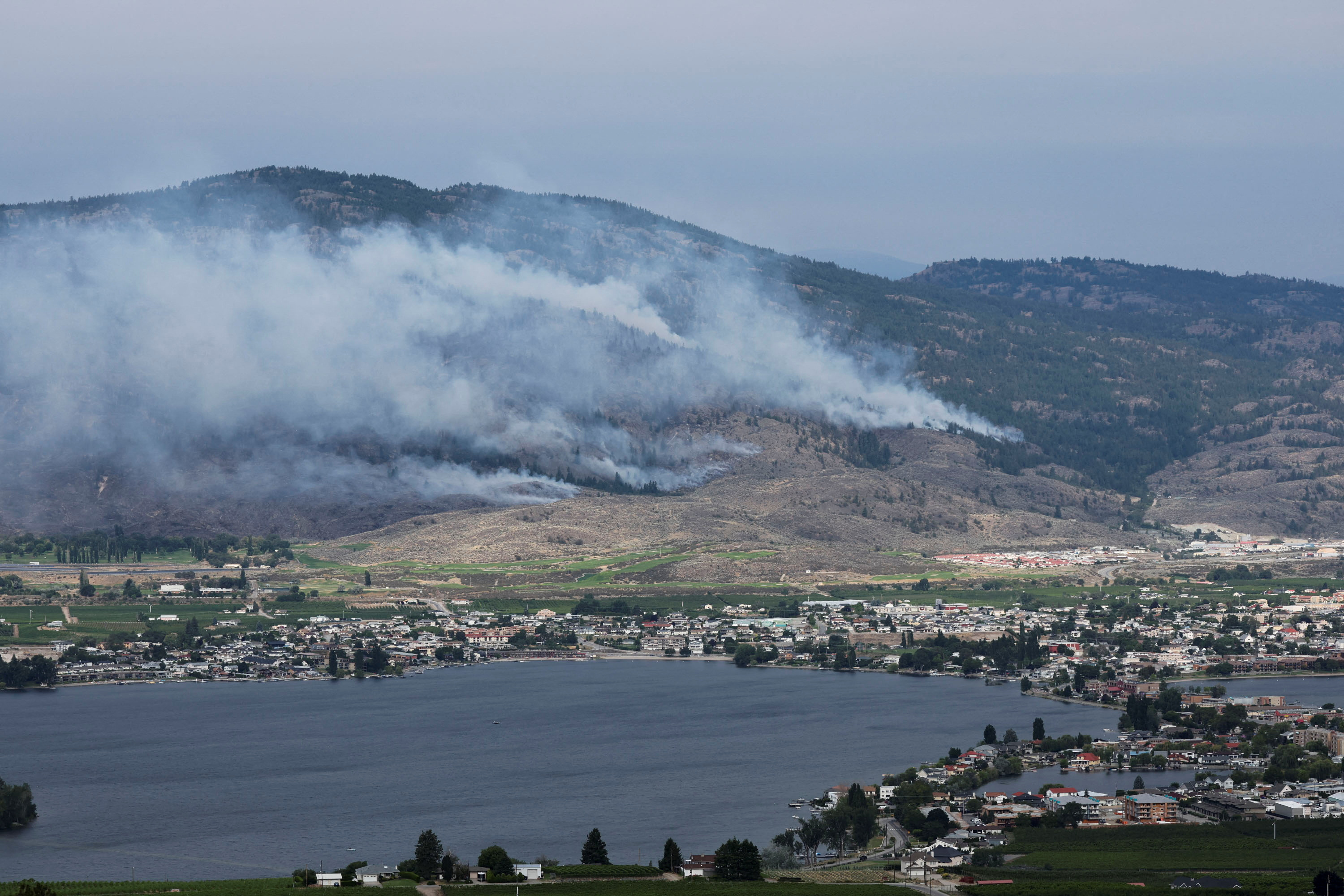 Evacuation order issued for western Canadian town as wildfire crosses ...