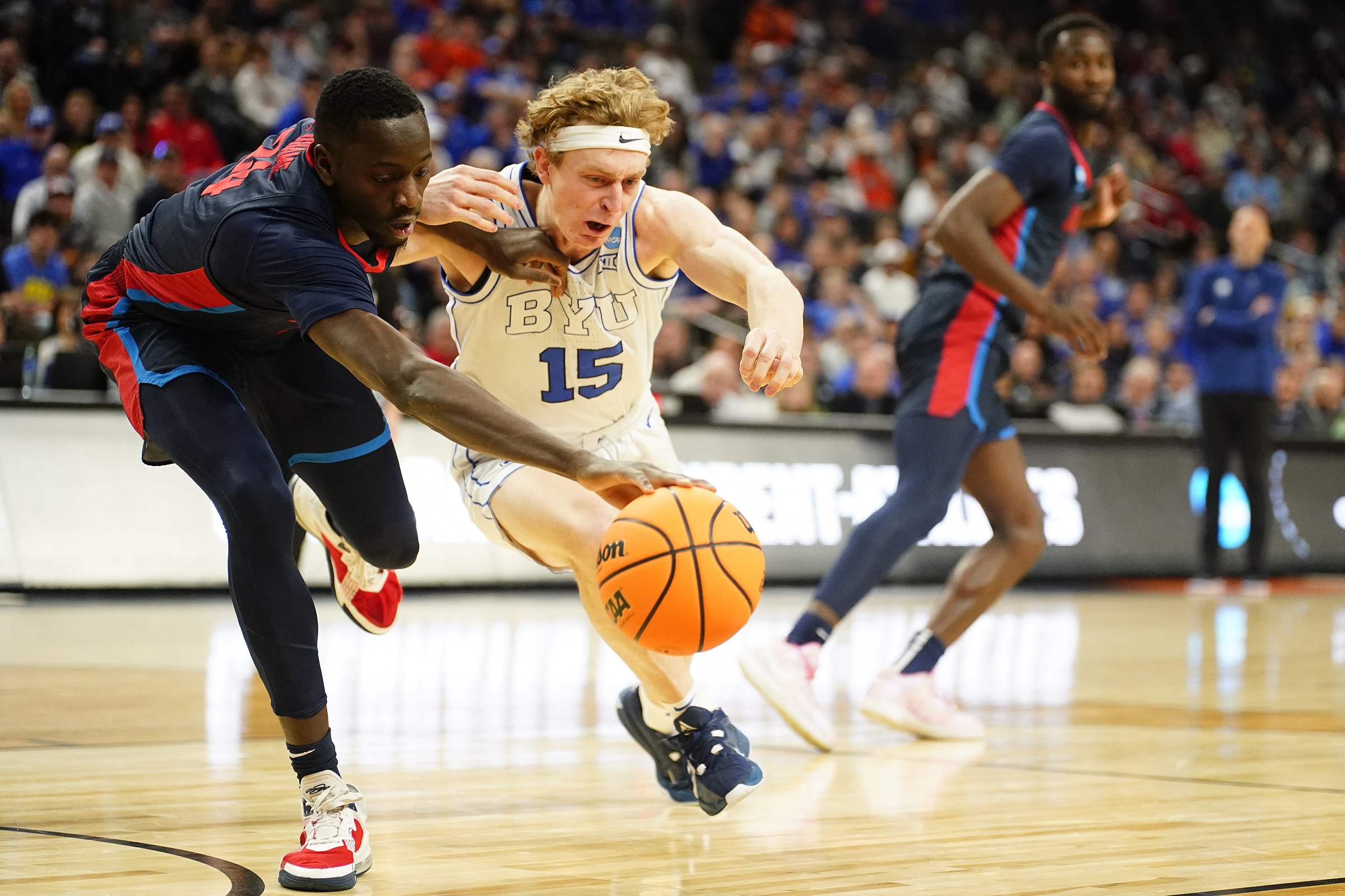 Duquesne upsets BYU for first NCAA tourney win in 55 years | Reuters