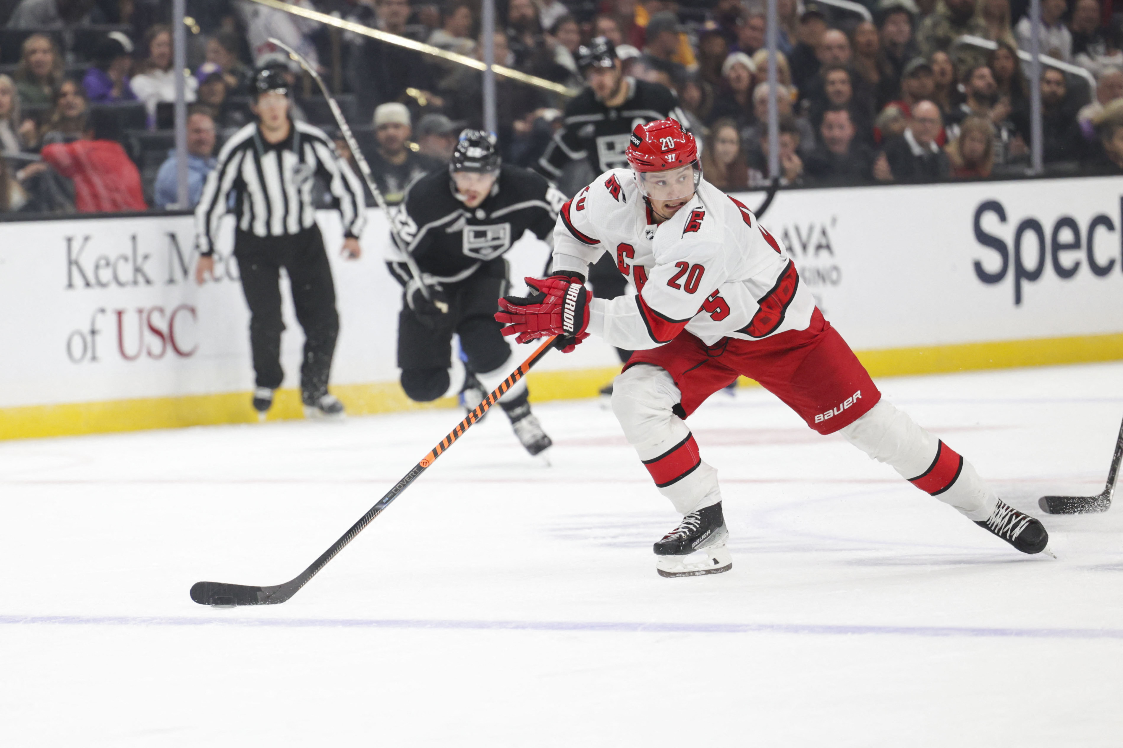 Hurricanes blow early lead, beat Kings in 9-round shootout | Reuters