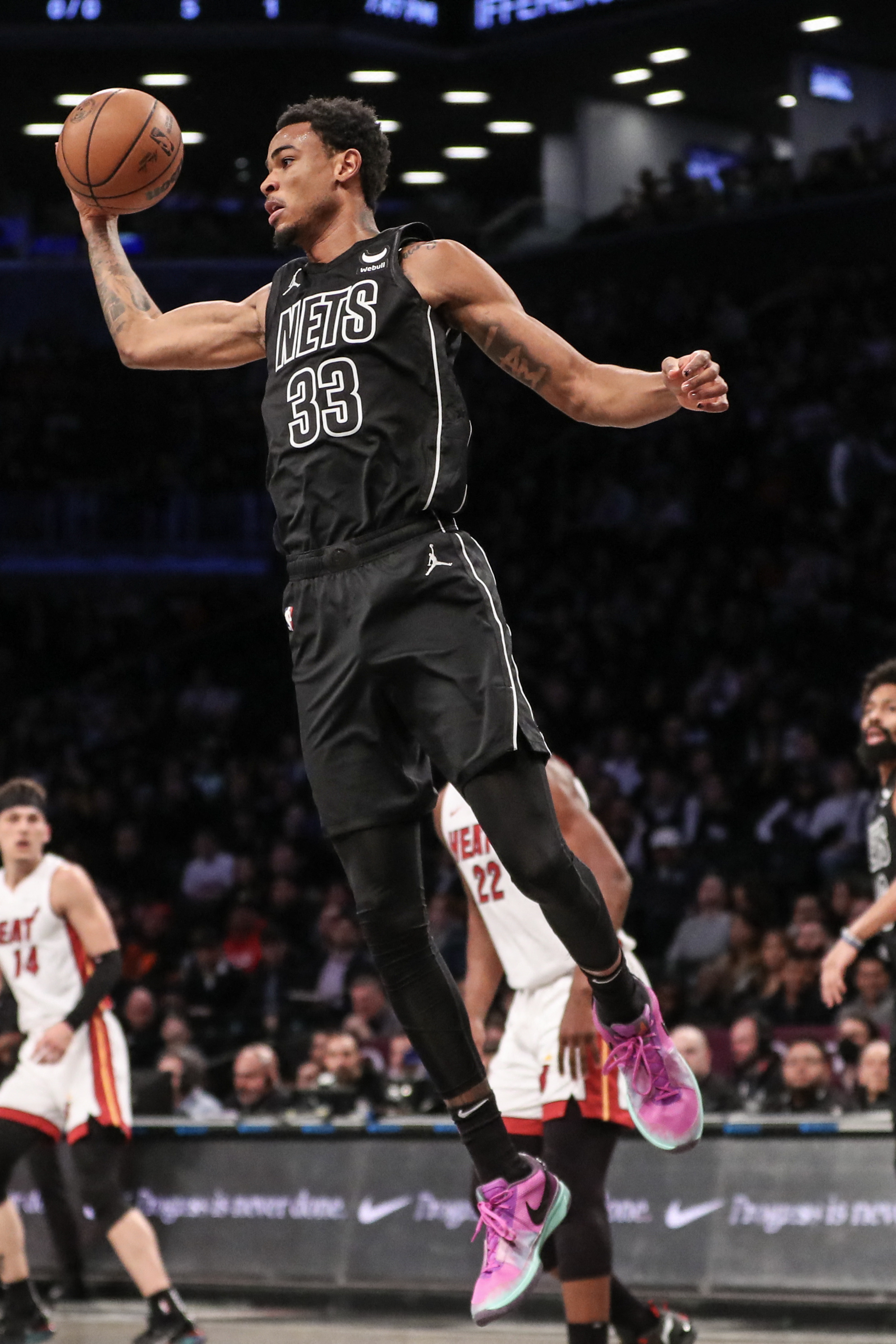 Jimmy Butler returns to guide Heat past Nets in OT | Reuters