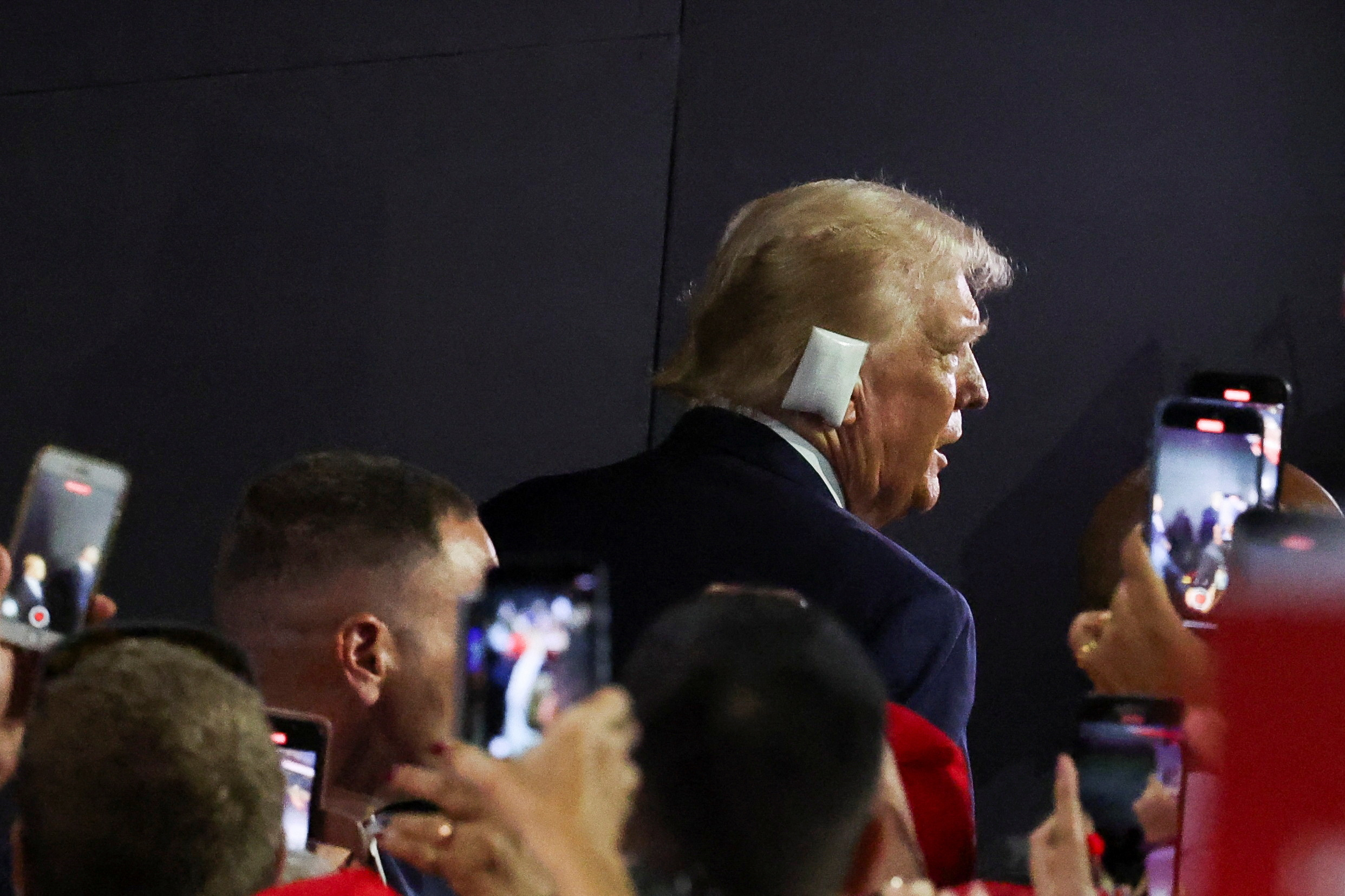 Trump appears at Republican National Convention with bandage on his ear ...