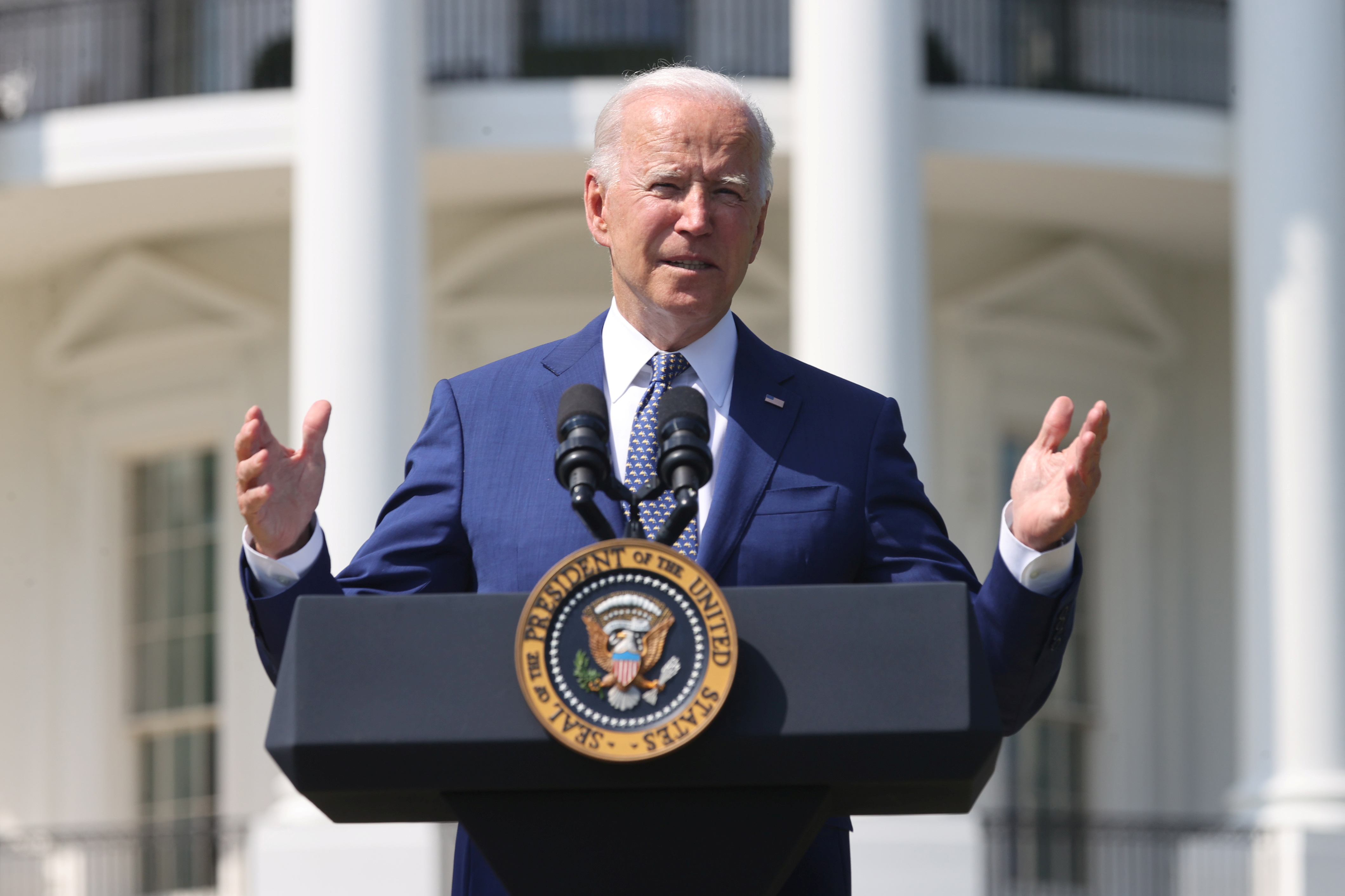 Biden says COVID-19 cases will go up before they come down | Reuters