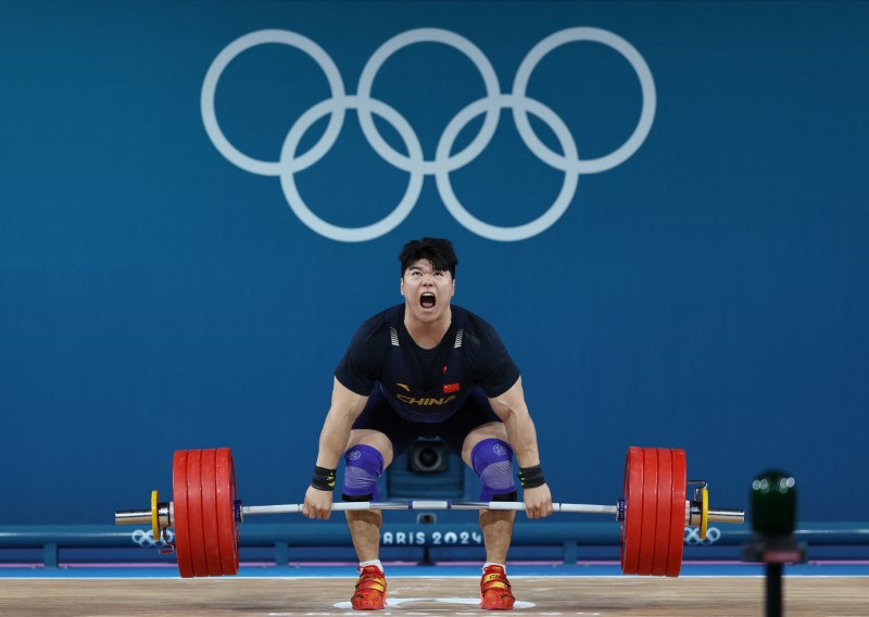 Weightlifting: China's Liu claims men's 102kg category gold | Reuters