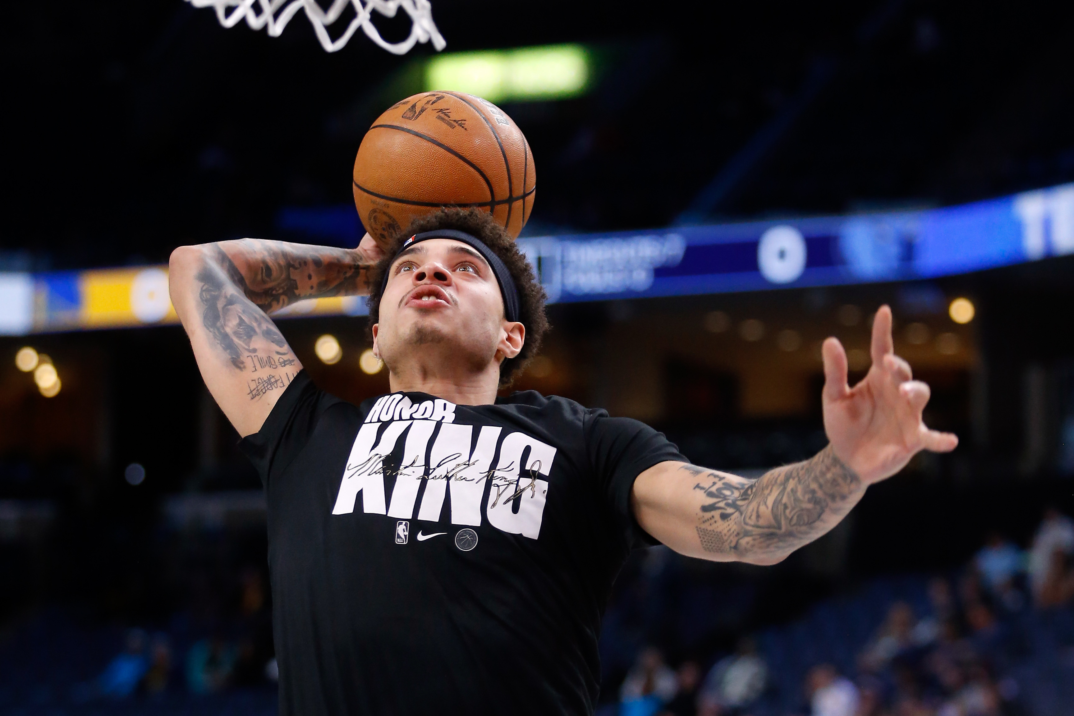 Grizzlies hold off Raptors to end losing streak | Reuters