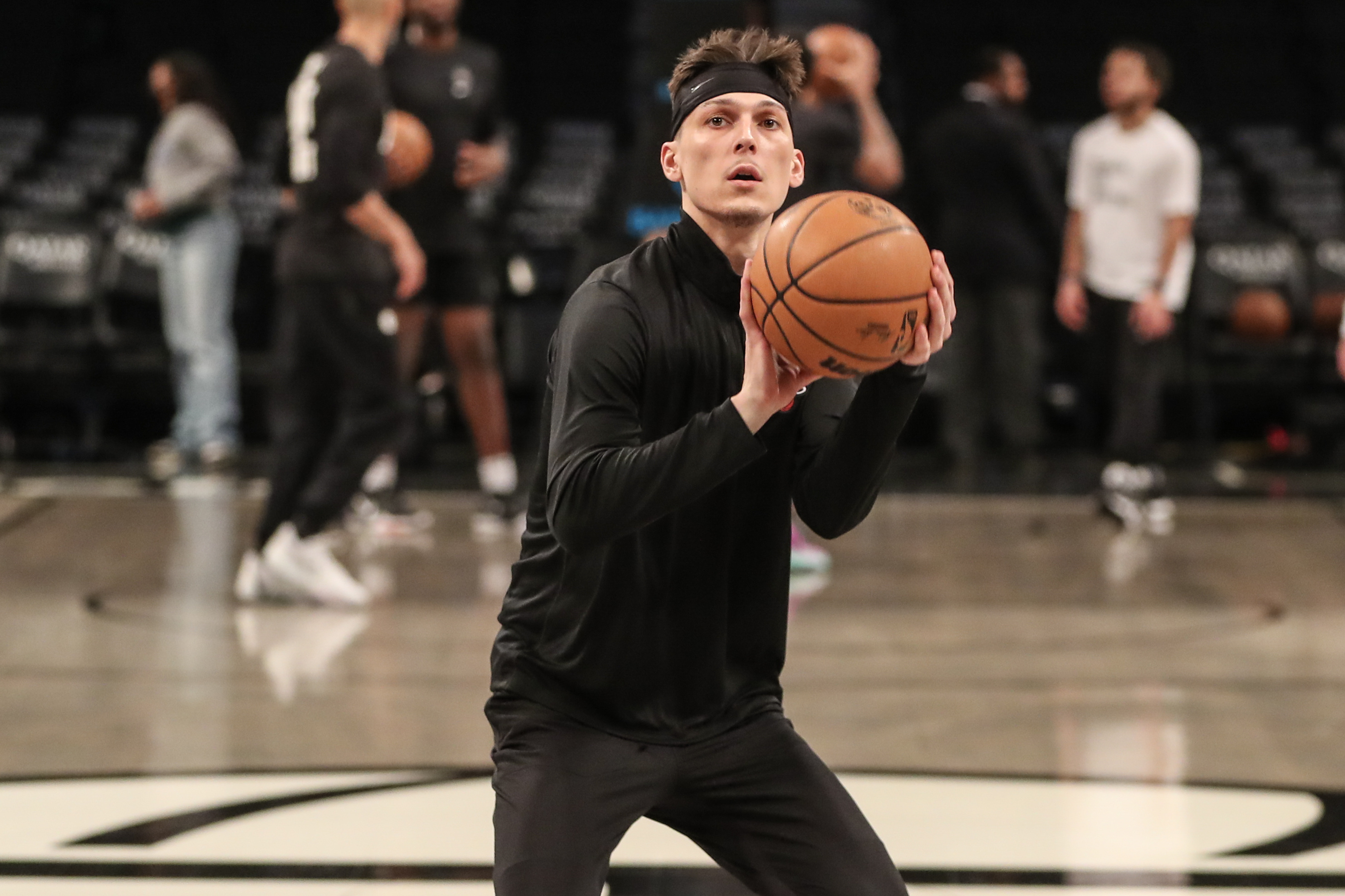 Jimmy Butler returns to guide Heat past Nets in OT | Reuters