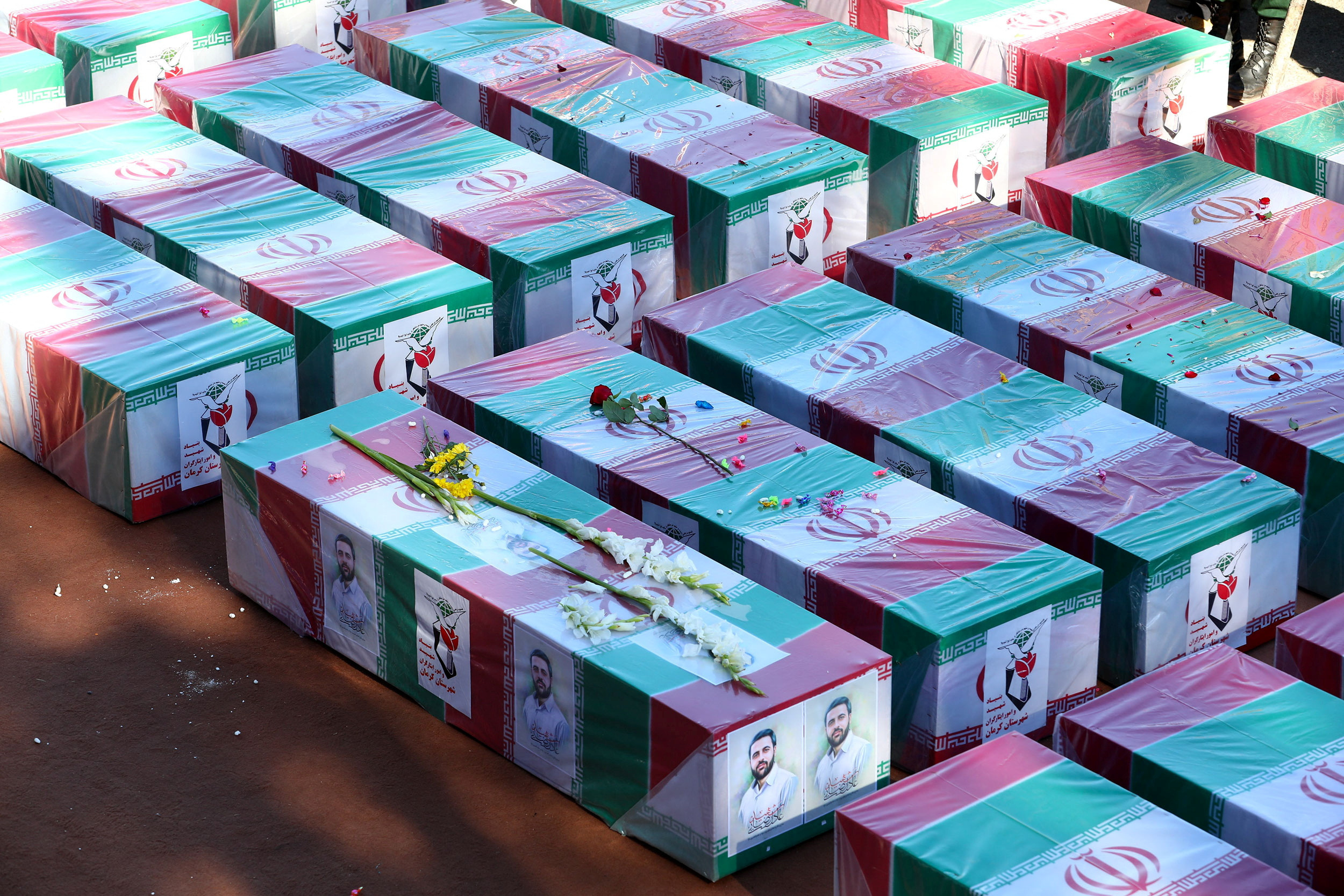 Iran arrests 11 suspects over bomb blasts, mourners demand revenge ...