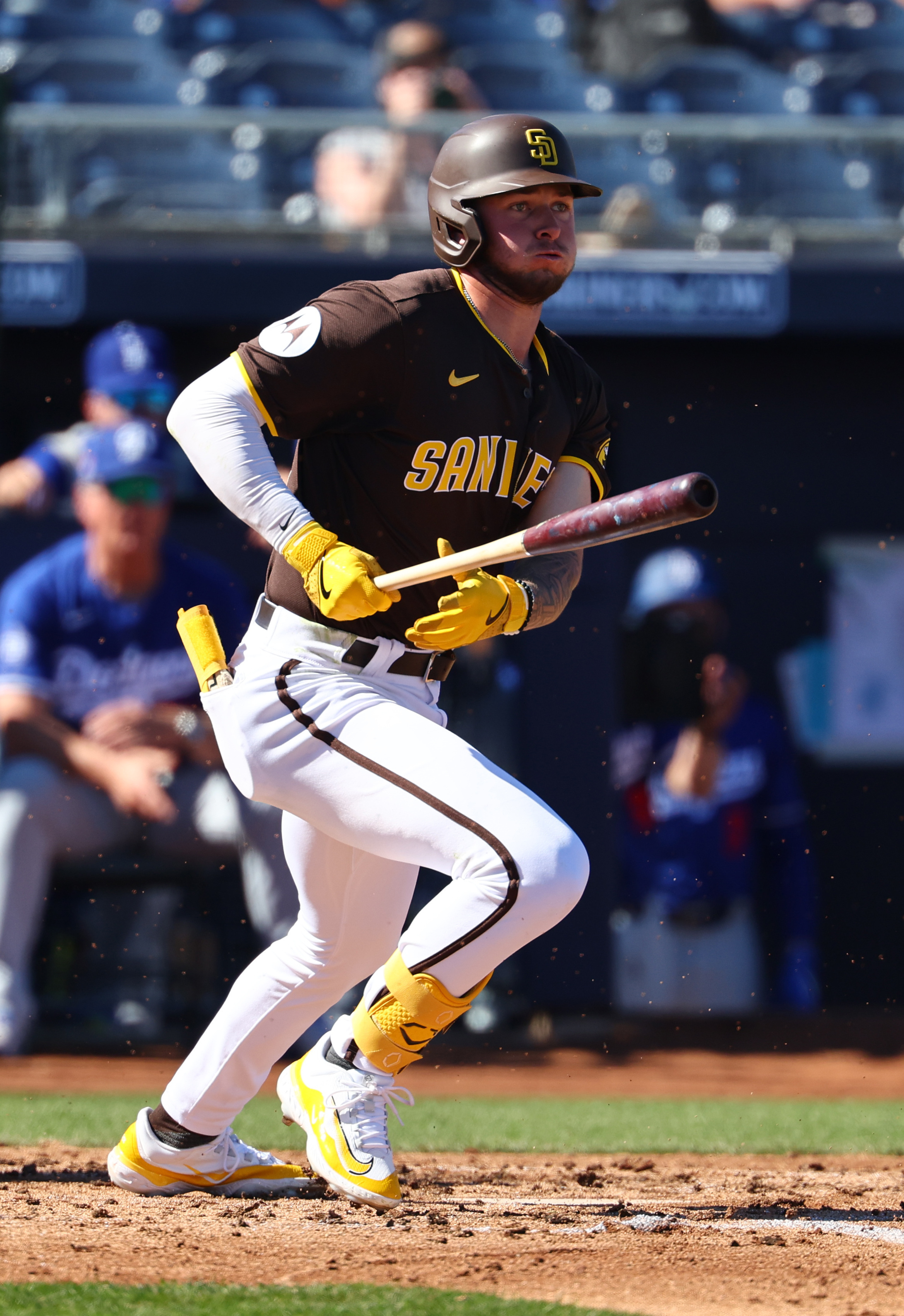 Dodgers open spring training with 14-1 rout of Padres | Reuters