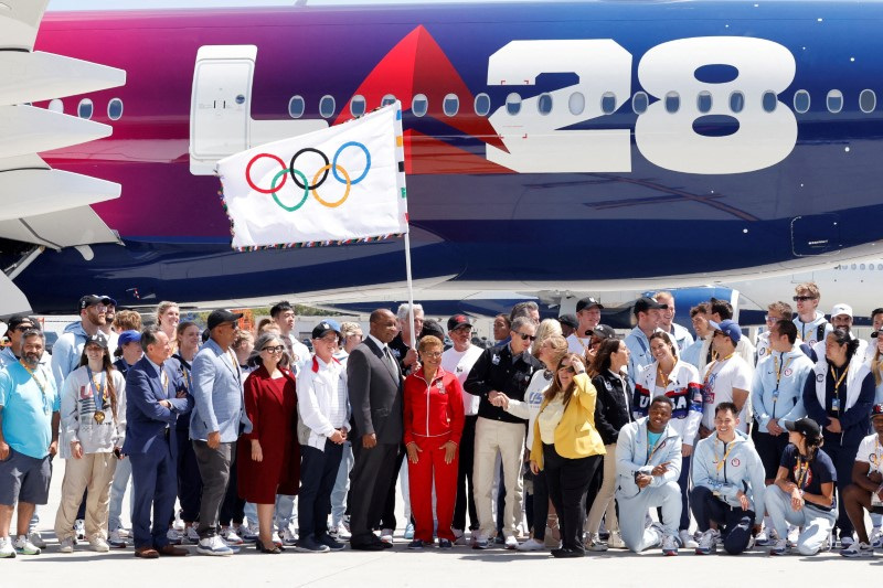Olympic flag arrives in Los Angeles, host city for 2028 Games | Reuters